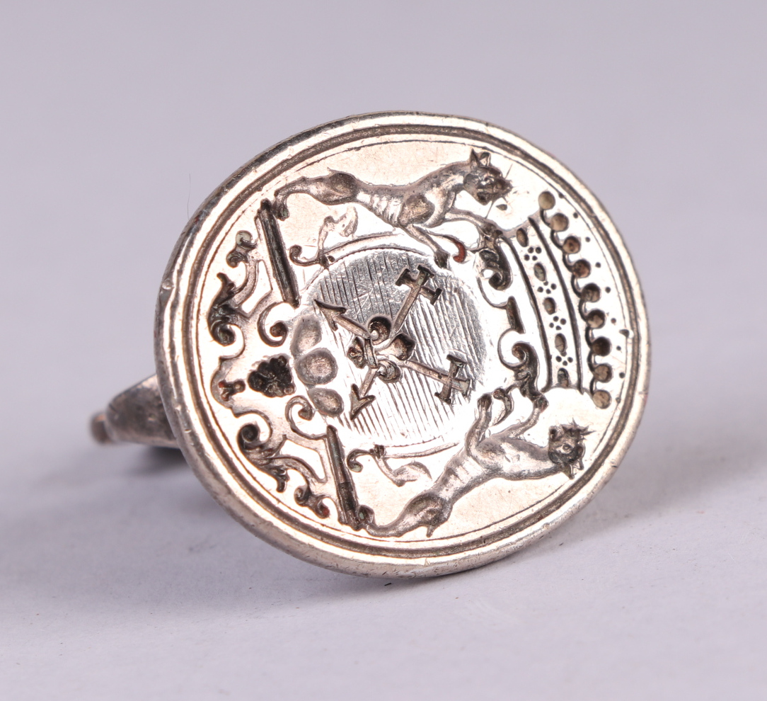 An 18th century continental white metal fob seal, the matrix engraved ...