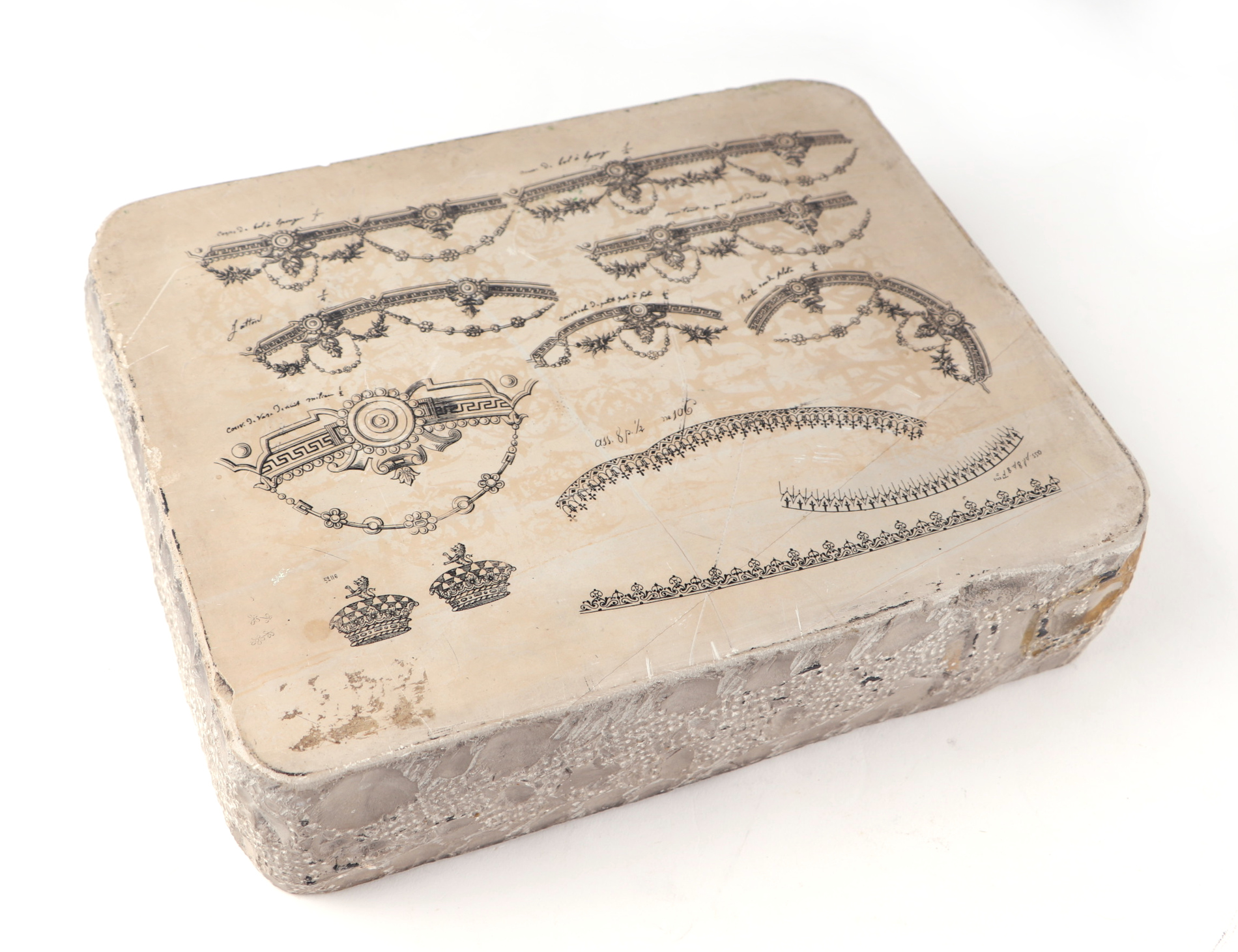A Victorian printing stone, with initials and foliate swag designs to ...