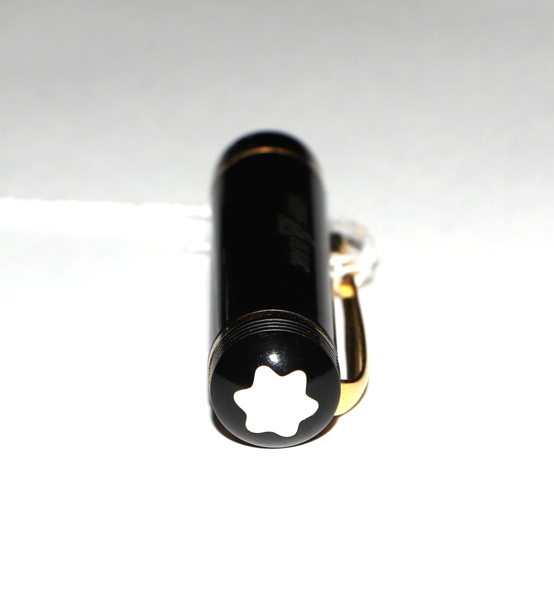 A black lacquer and gilt metal fountain pen with iridium point nib ...