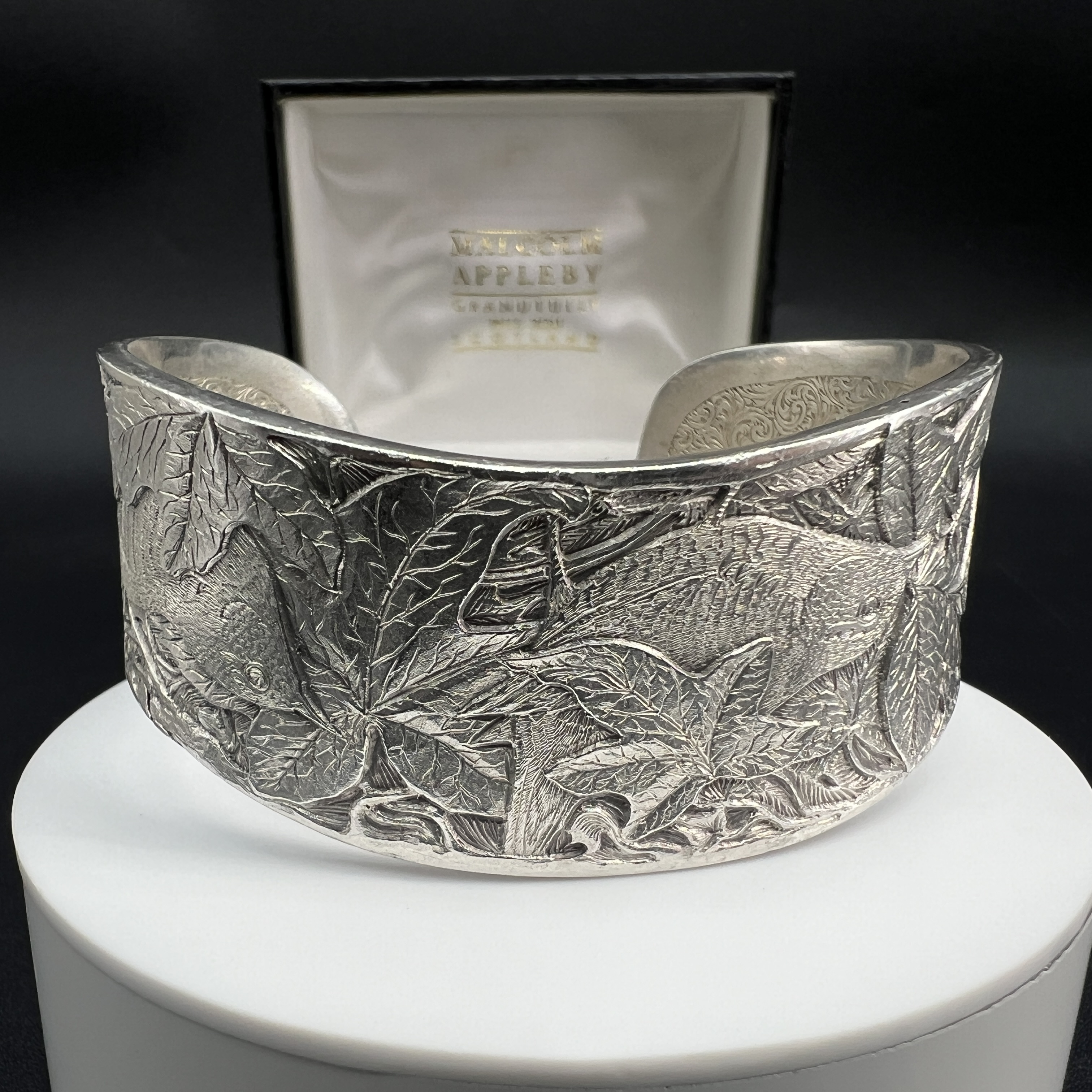 A Scottish silver bangle by Malcolm Appleby, Malcolm Appleby wren and ...