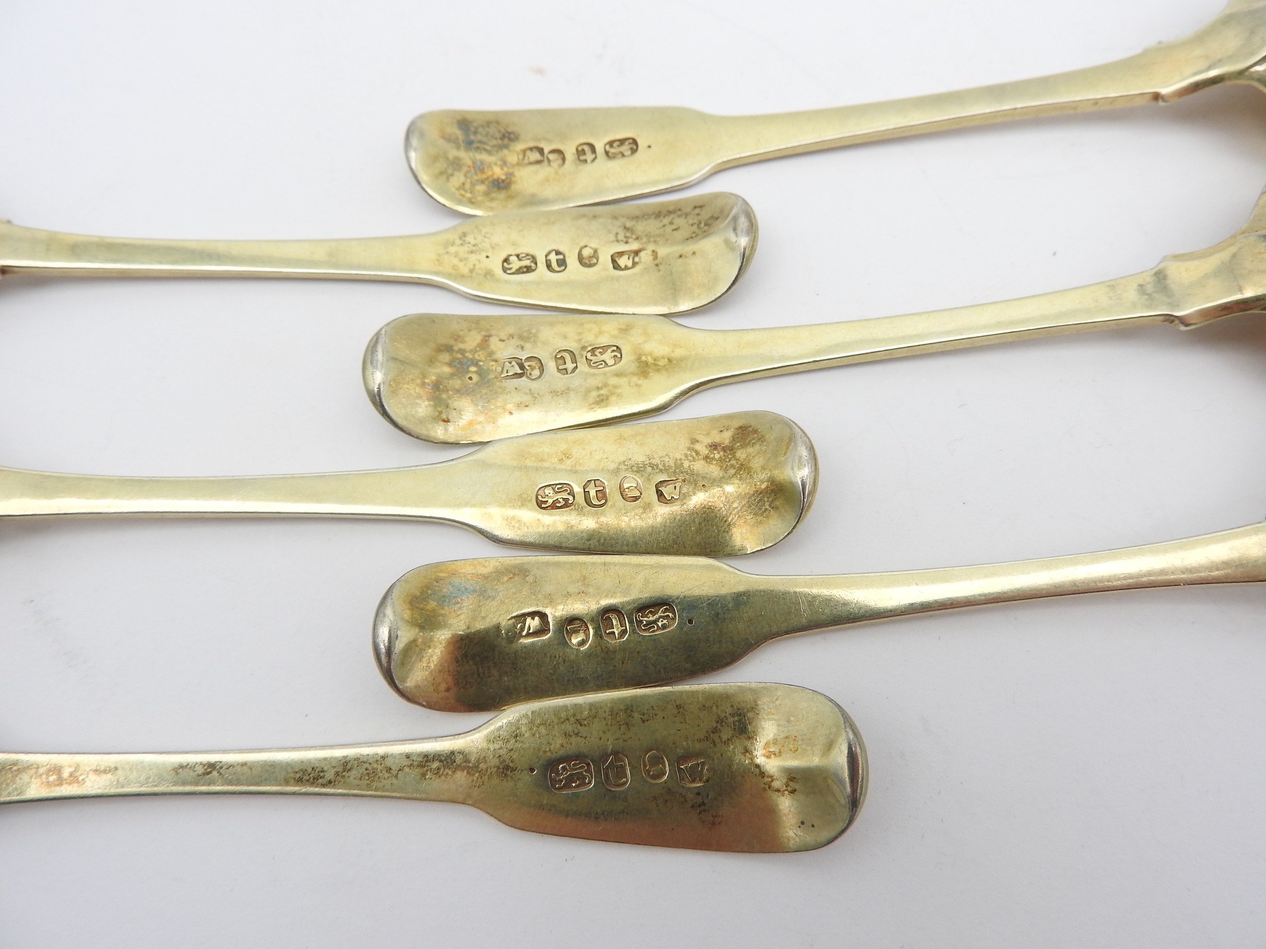 A SET OF SIX WILLIAM IV SILVER-GILT TEASPOONS, the fiddle pattern ...