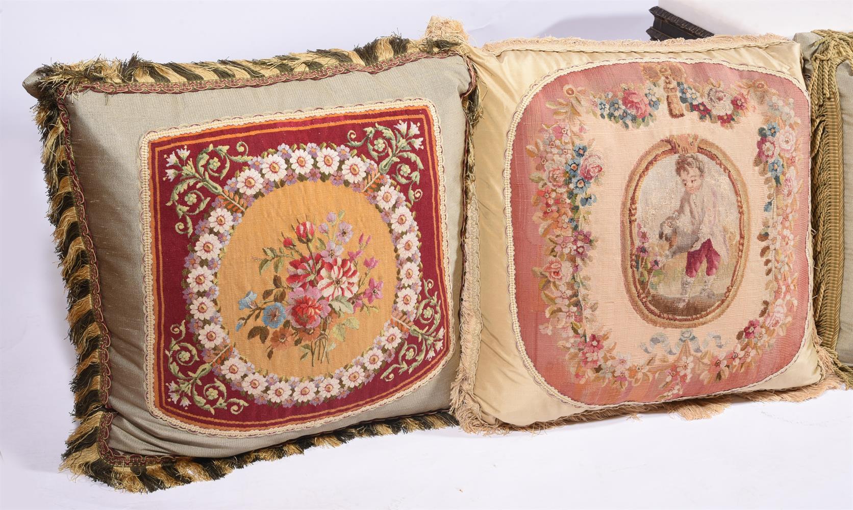 SIX LARGE CUSHIONS INCORPORATING 18TH CENTURY AND LATER WOOLWORK AND ...