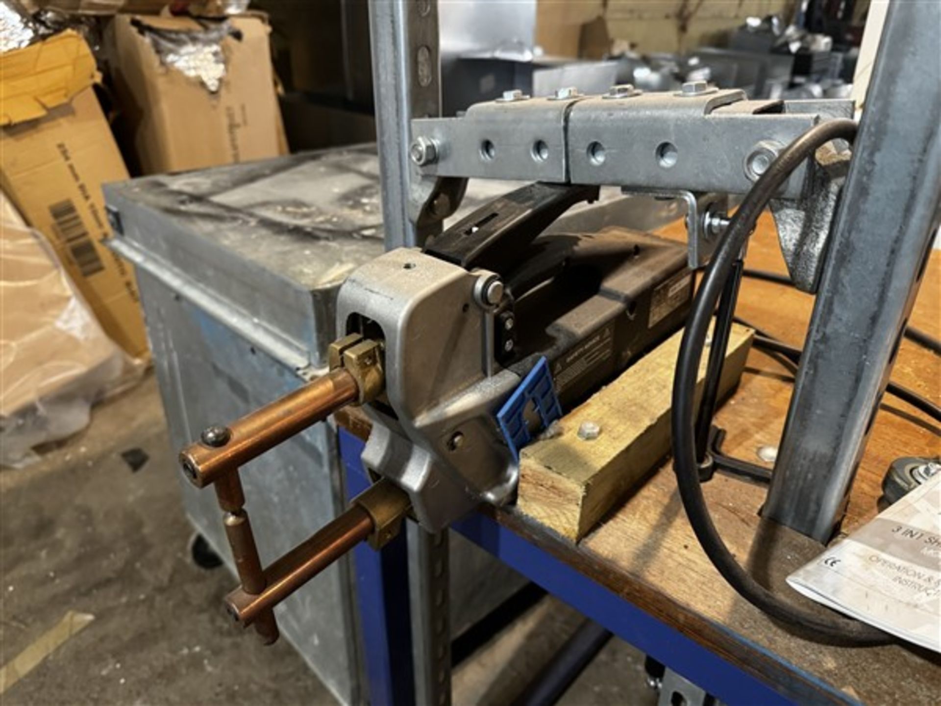 Table with mounted spot welder - model: Clarke CSW6T, and metal folder ...