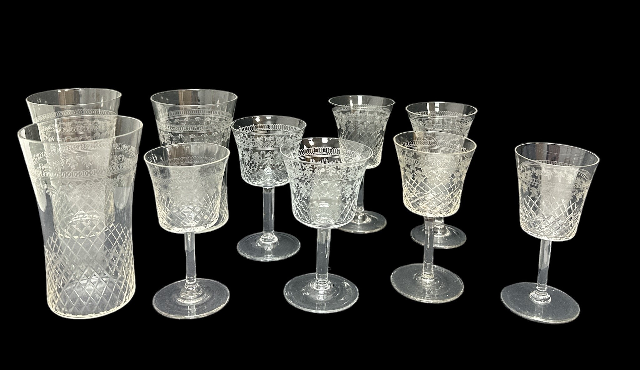 Ten delicate cut glass glasses including seven wine/ sherry glasses and ...
