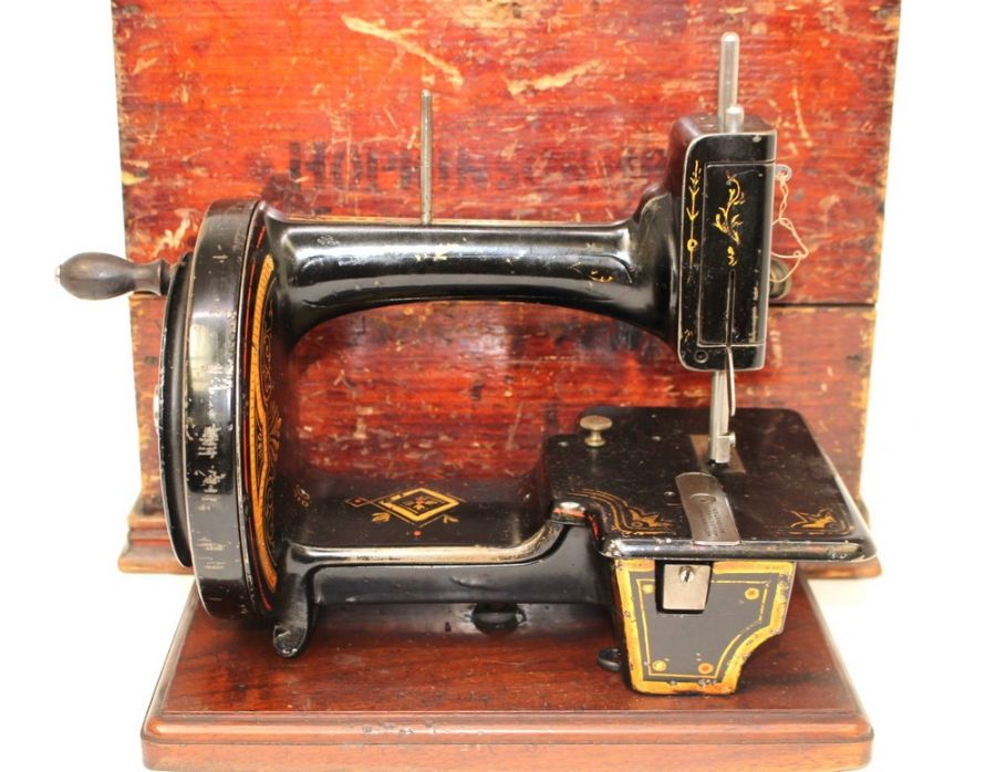A late 19th Century Hopkinson Bros sewing machine within a wooden carry ...