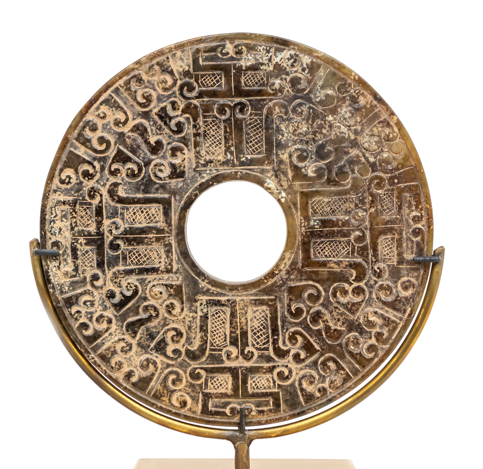 A pair of Chinese carved jade bi discs in archaic style, 20th century ...