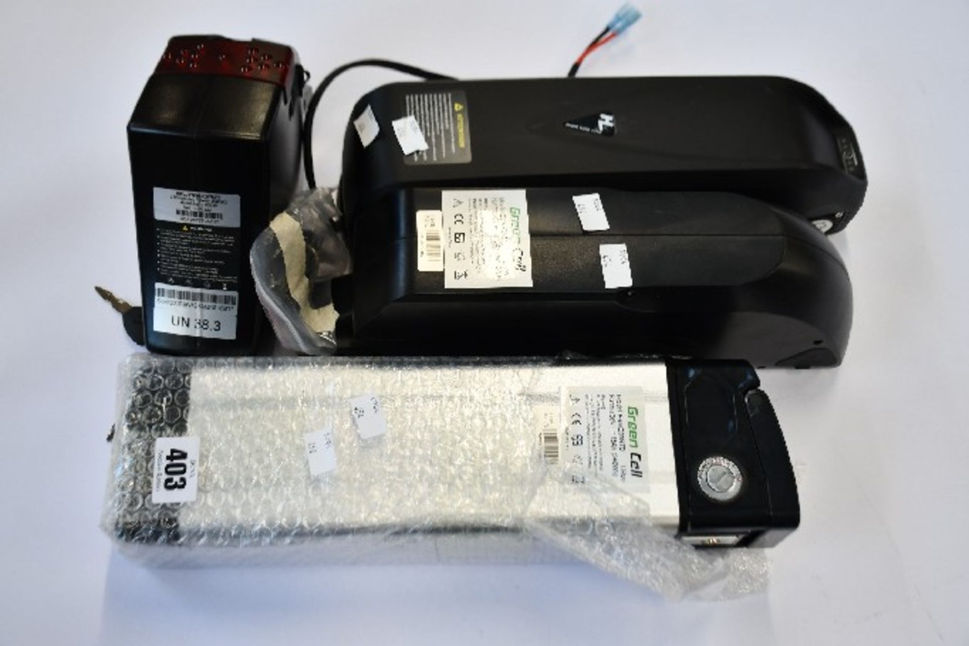 Four branded E-Bike Batteries to include: 1x HL Down Tube Type Battery ...