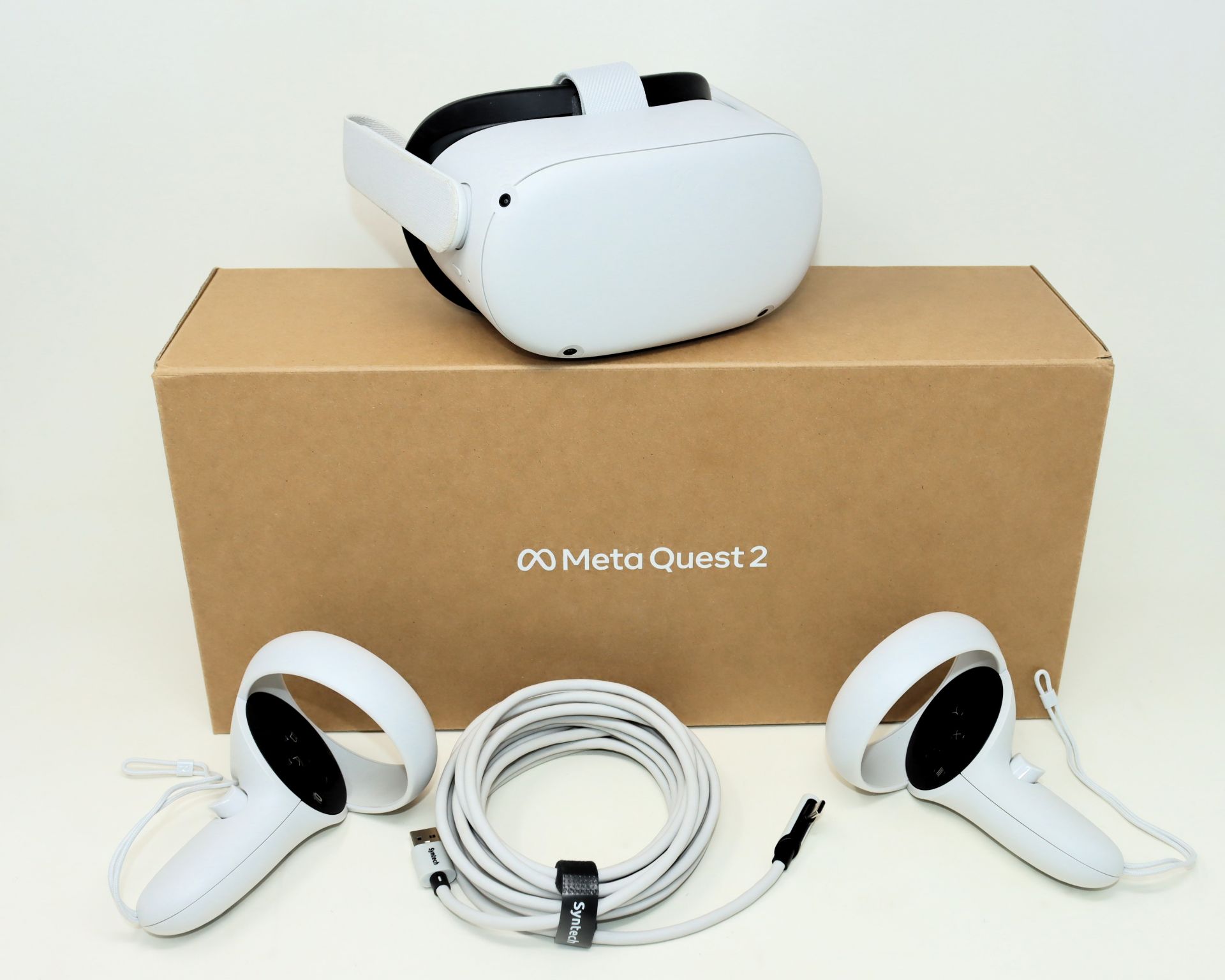 A pre-owned Meta Quest 2 128 GB All-In-One VR Headset with Controllers ...