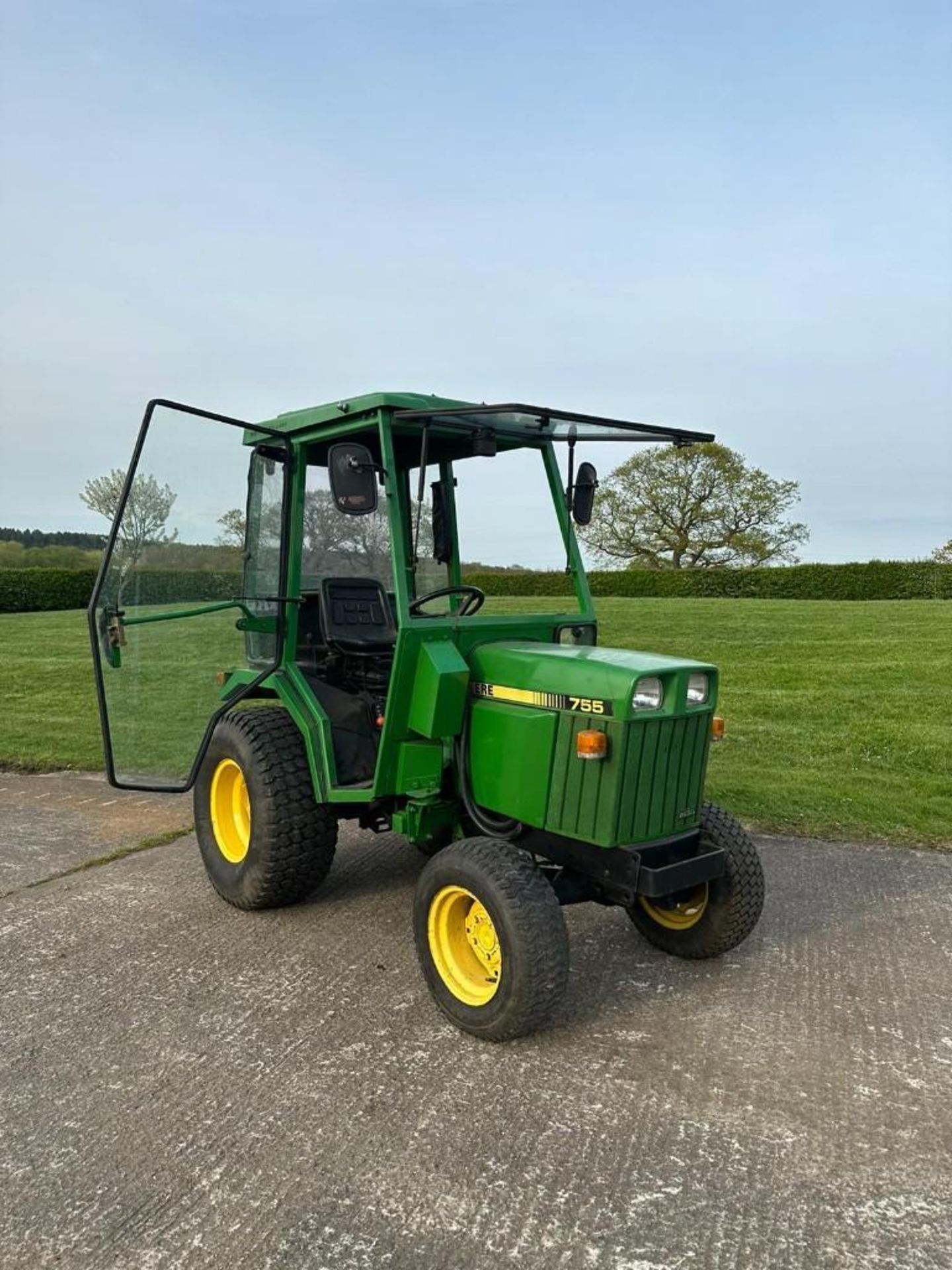 John Deere 755 compact tractor 4WD fitted with Walter Mauser cab, in ...