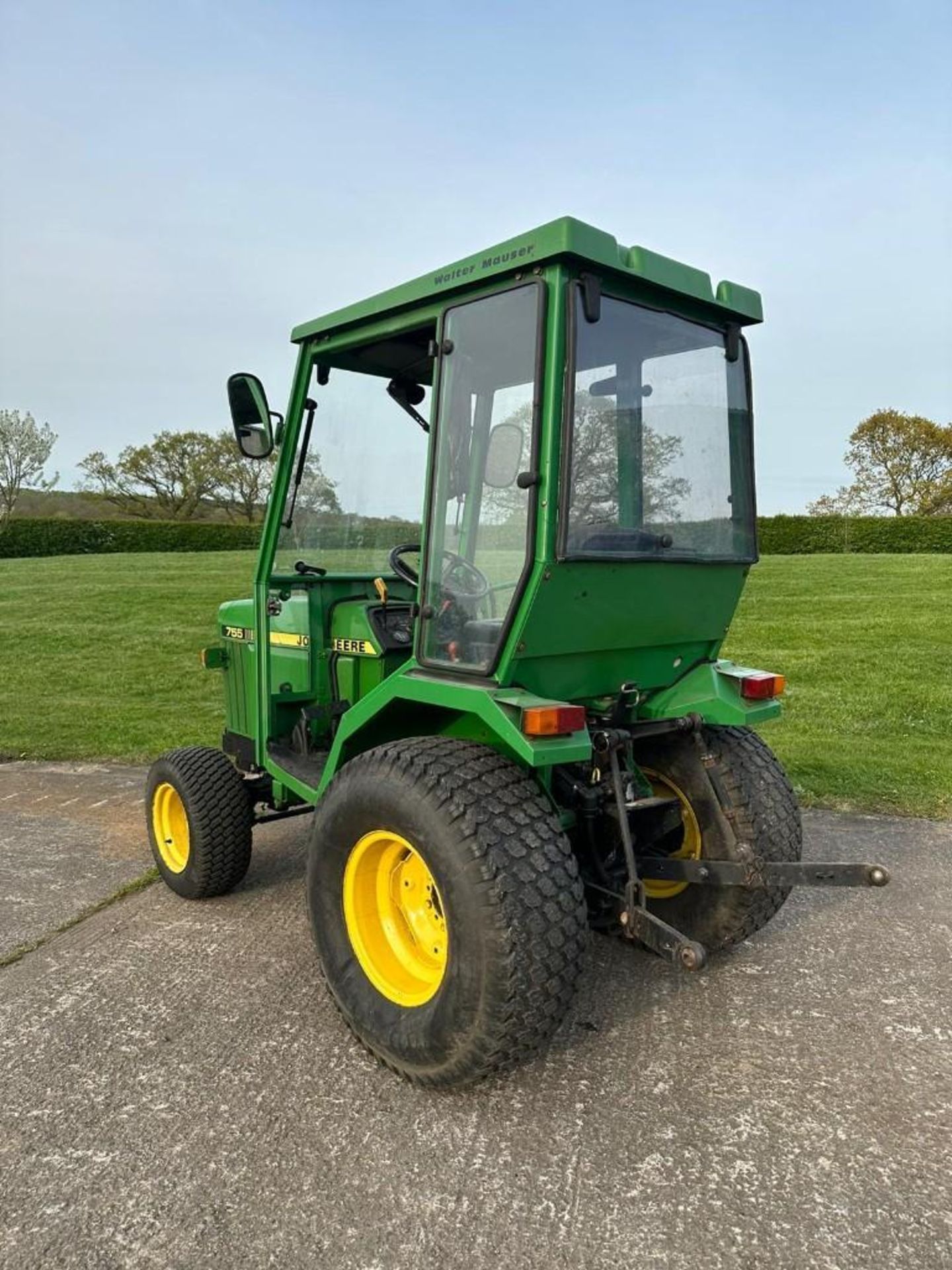 John Deere 755 compact tractor 4WD fitted with Walter Mauser cab, in ...