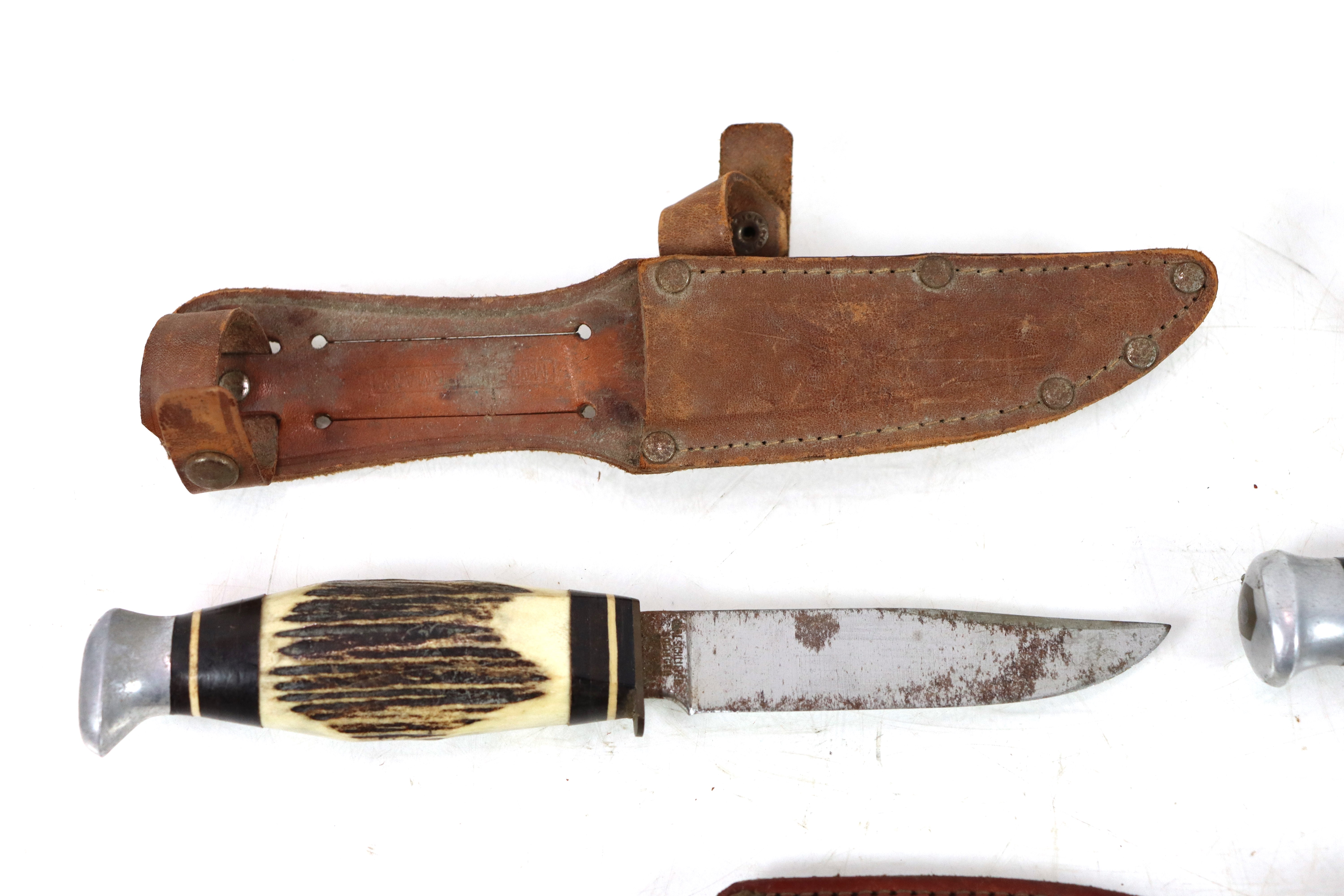 Two sheath knives with a pocket knife by Kenbourne Sheffield and a ...