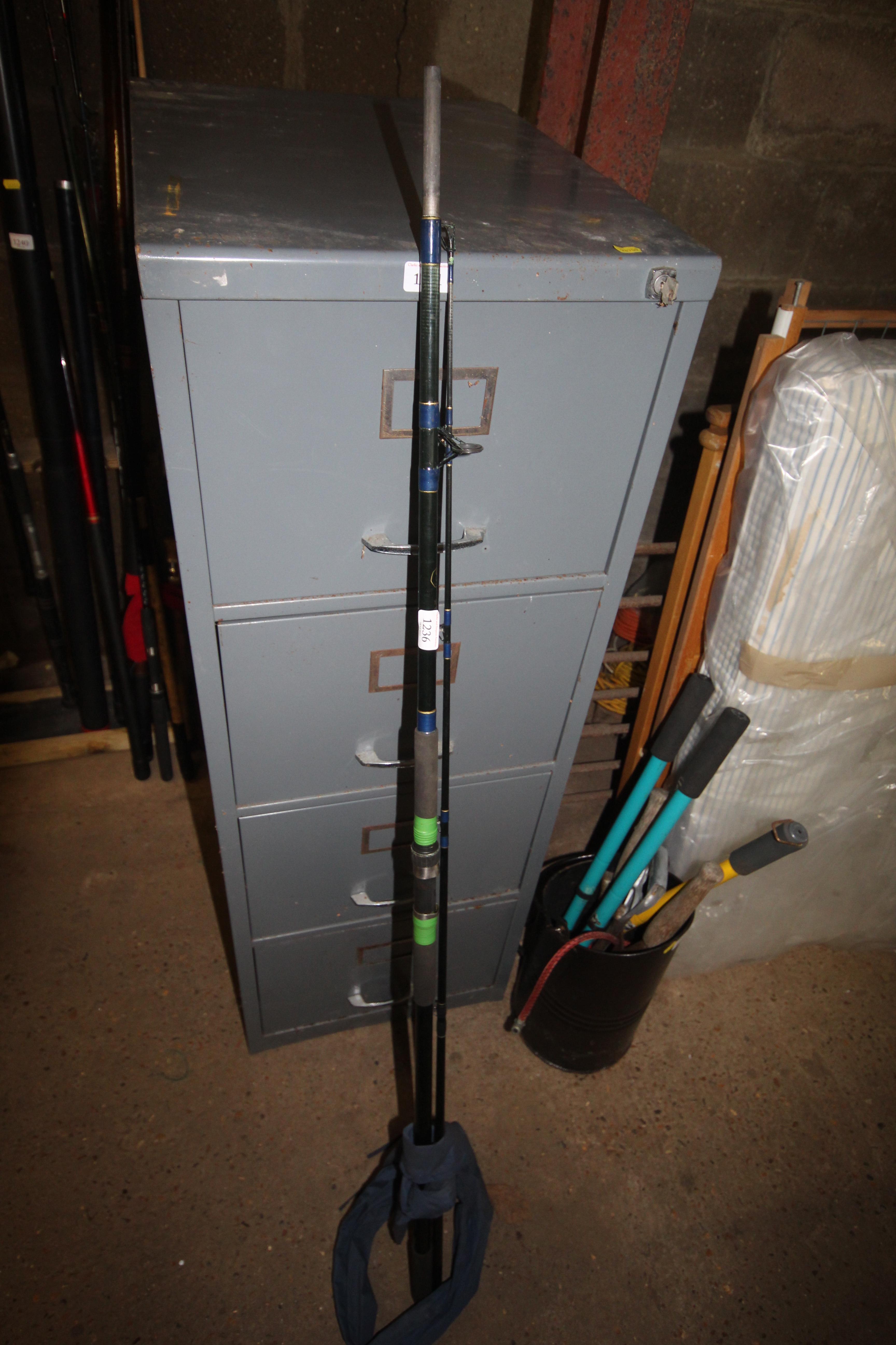 A Sundridge two piece fishing rod with carry bag