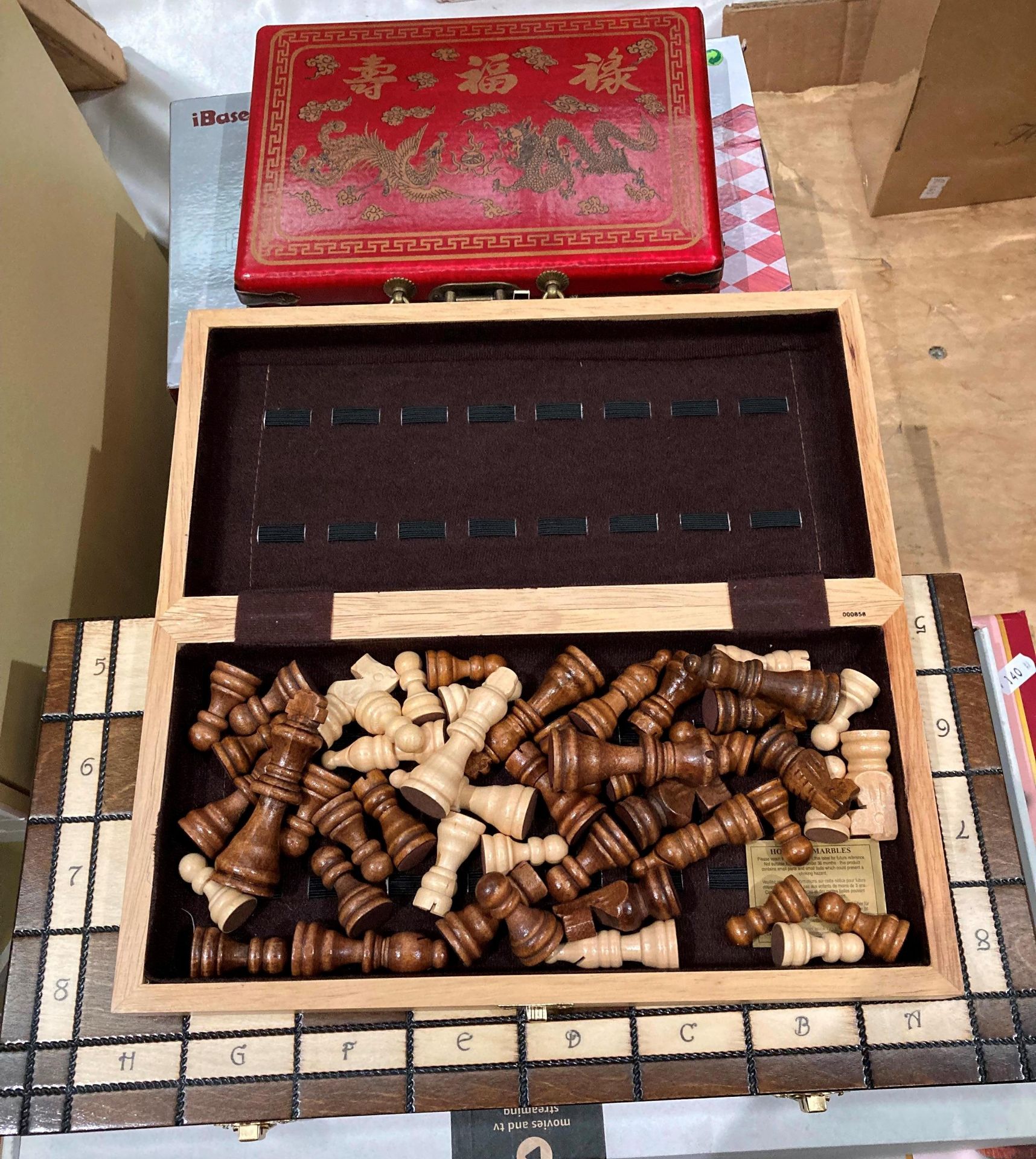 Six assorted cased game sets including 5 x Chess, 1 x Mahjong, tin of ...