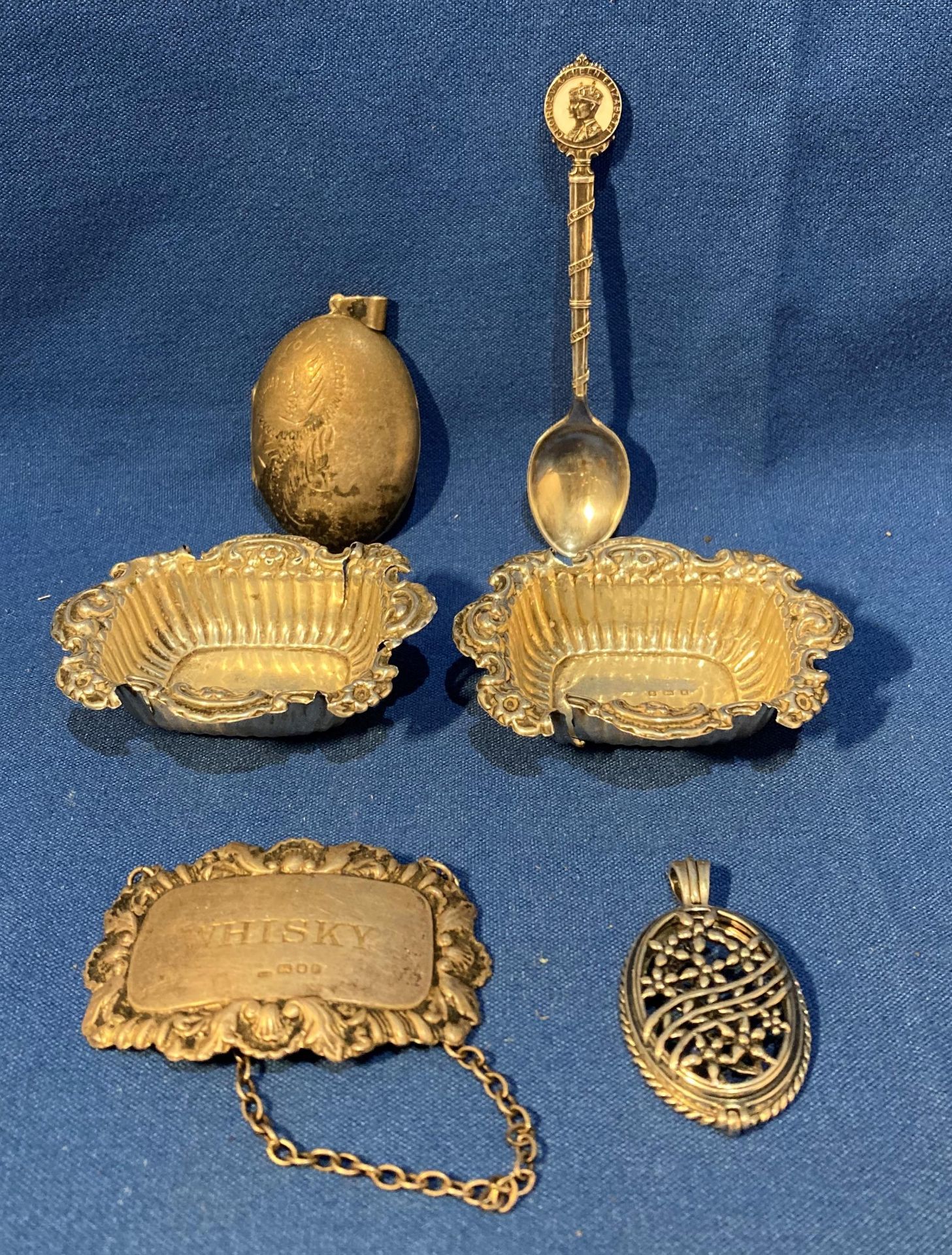 Five assorted silver hallmarked items including two lockets, spoon ...