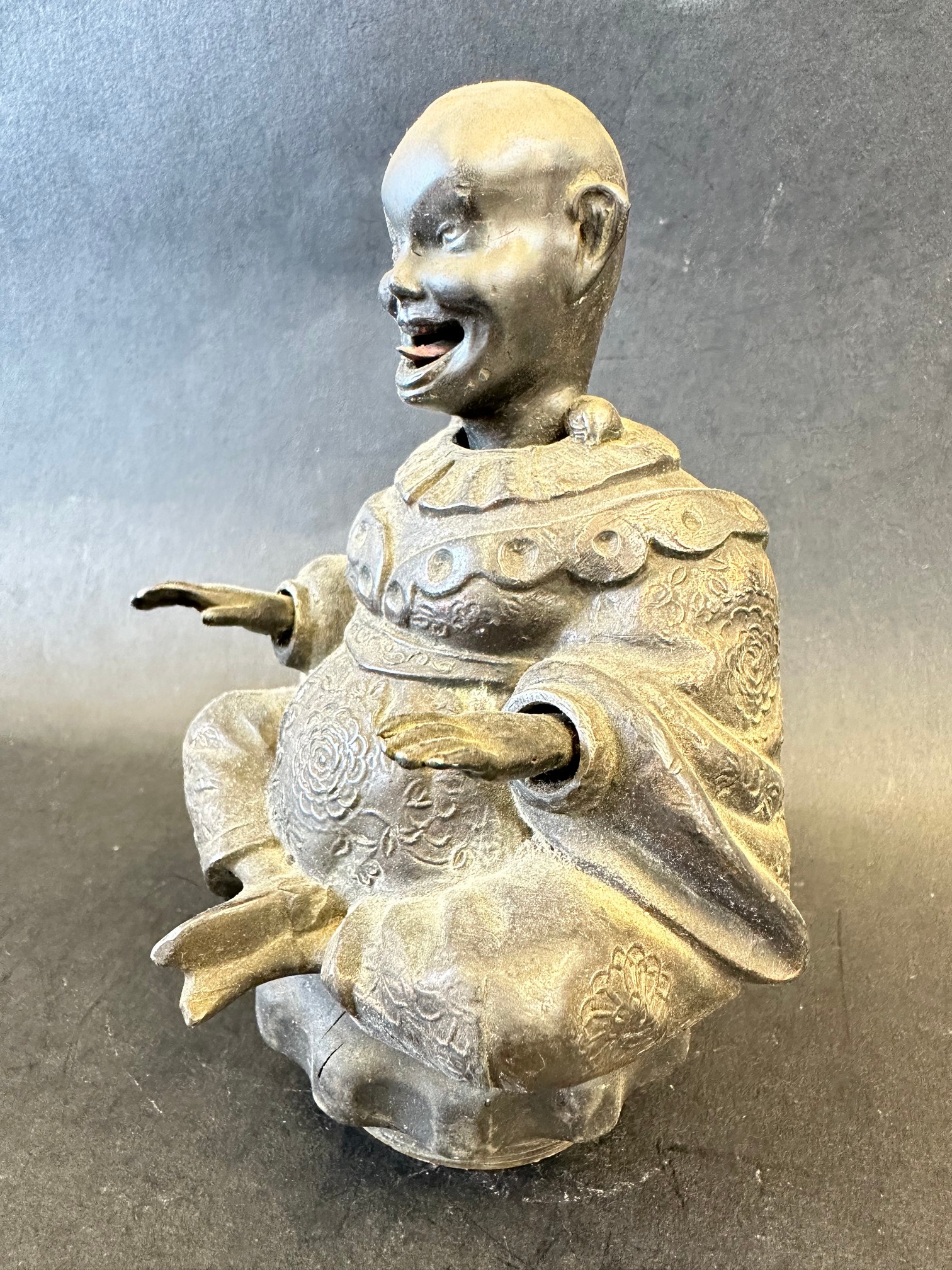 A 'Nodding Buddha' car mascot, British, circa 1900, marked CHU-SMEE ...