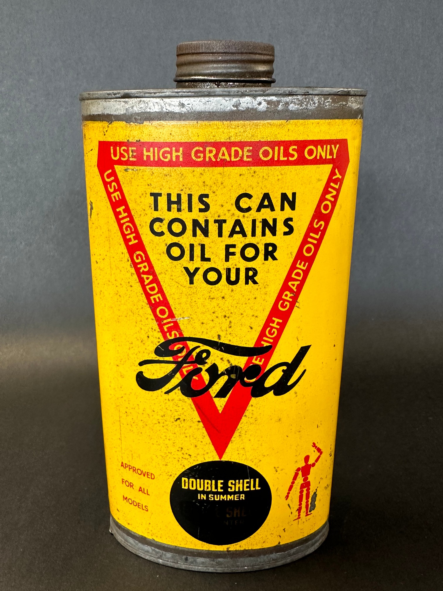 A rare Ford oval oil can, containing Double Shell and bearing stickman ...