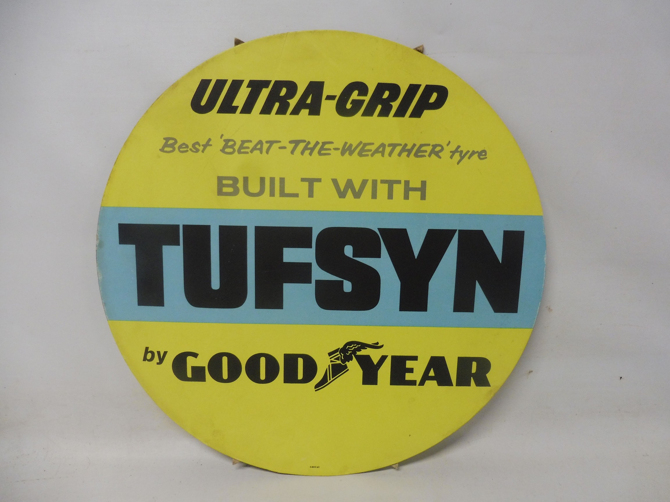 A Goodyear Tyres circular cardboard tyre insert sign for Tufsyn Ultra ...