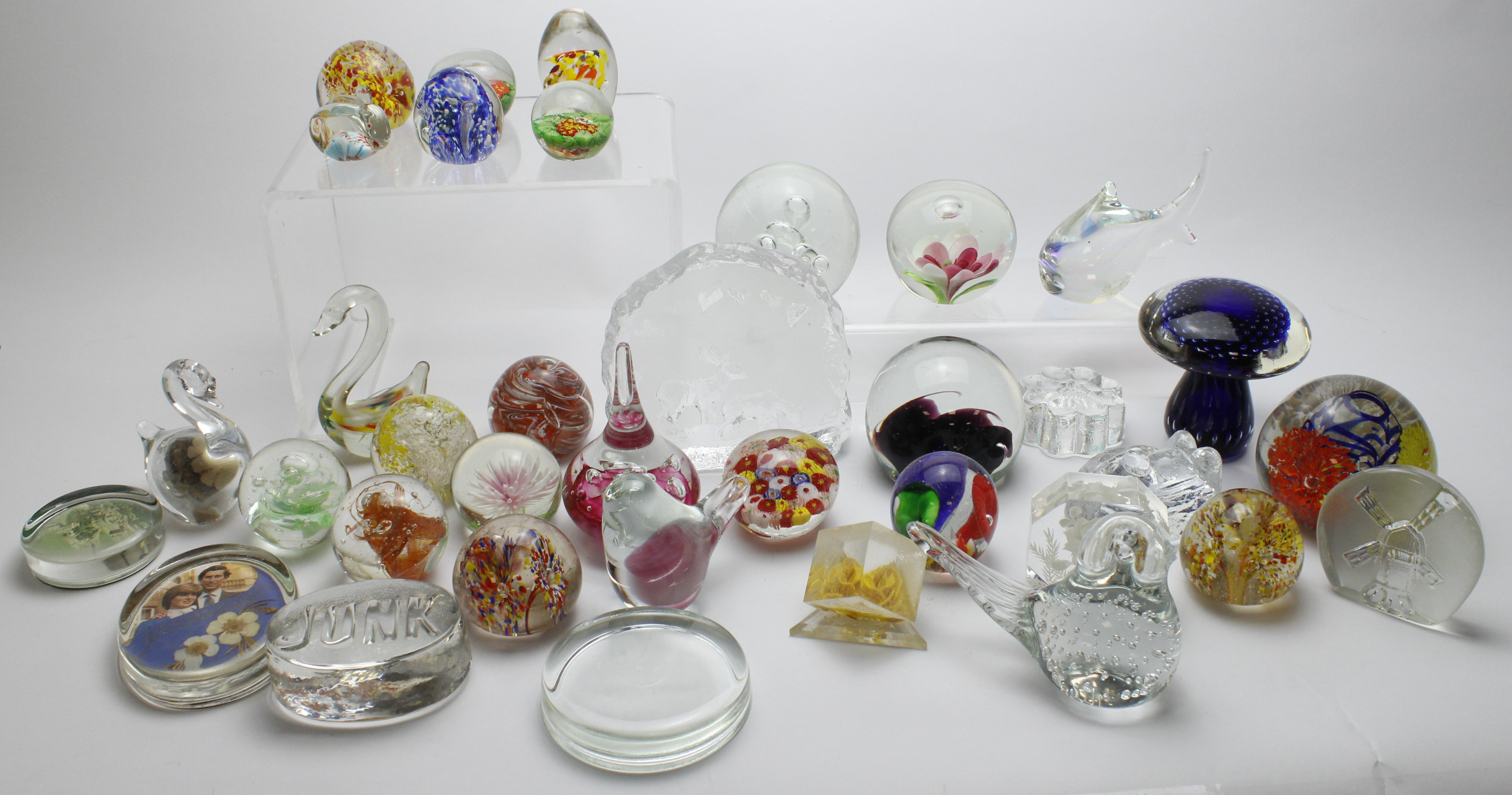 Paperweights. A large collection of over fifty glass paperweights ...