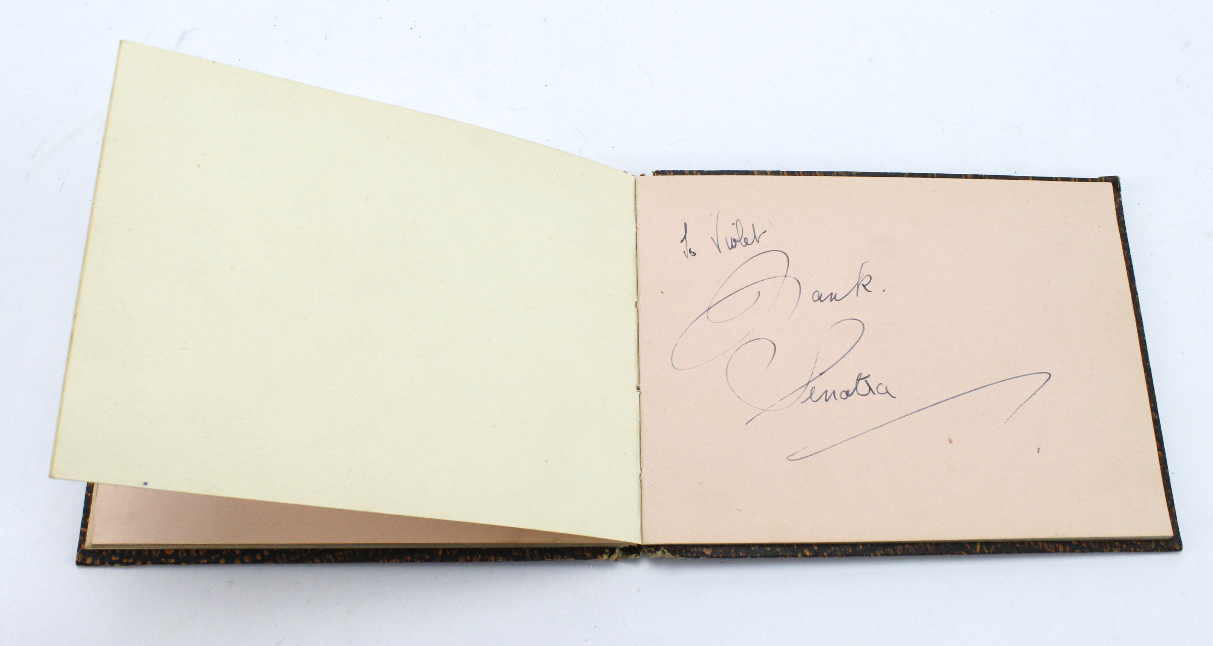 Autograph Album. An album containing several signatures, including ...