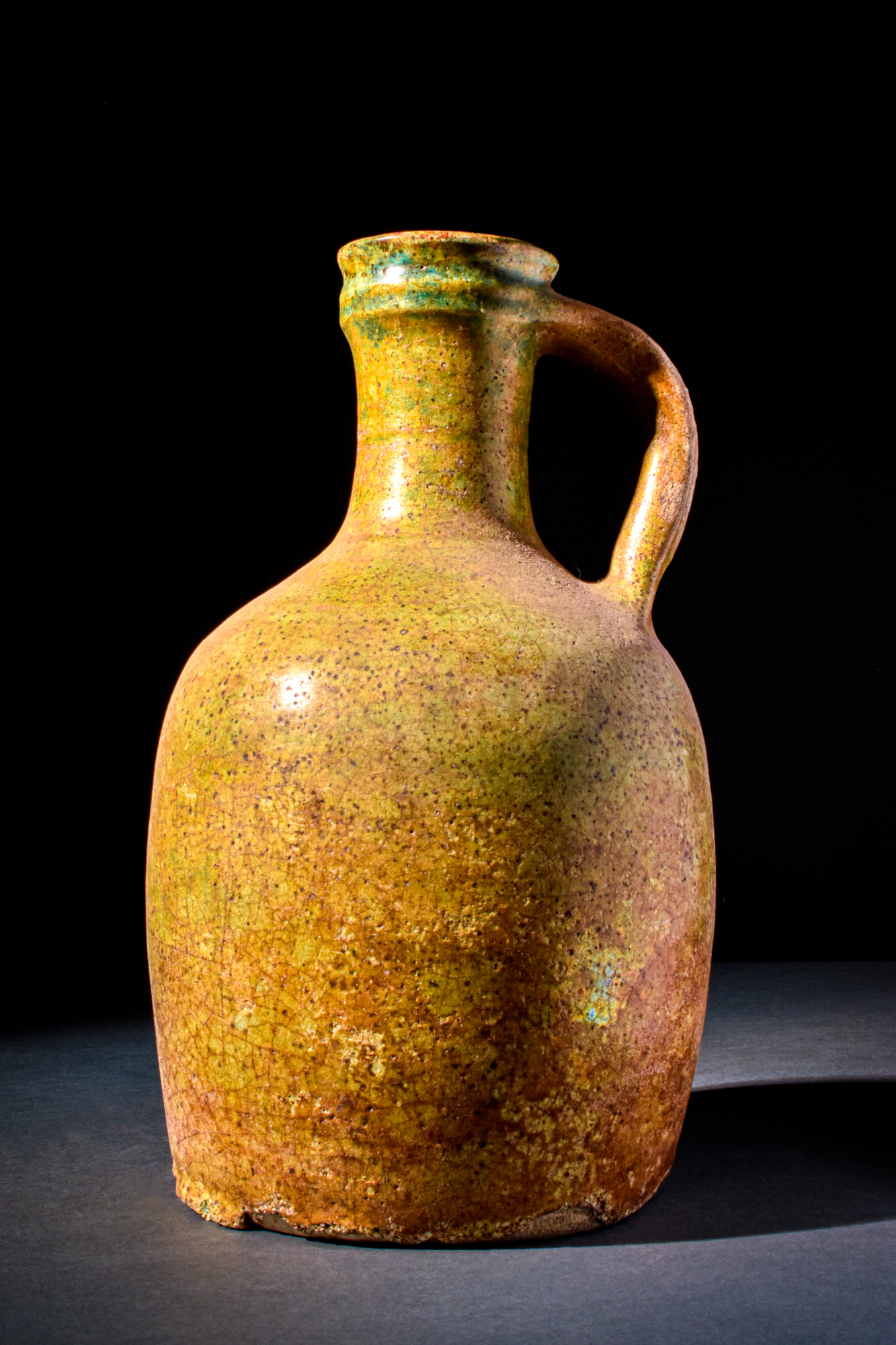 Ca. 1st-2nd Century AD.A wheel-thrown pottery jug with a bell-shaped ...