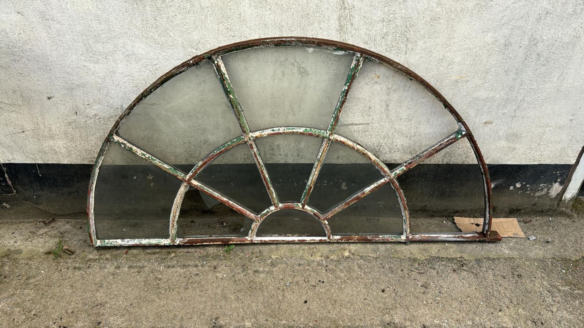 A Georgian fret cast iron arched Window, approx. 28in high x 54in wide ...