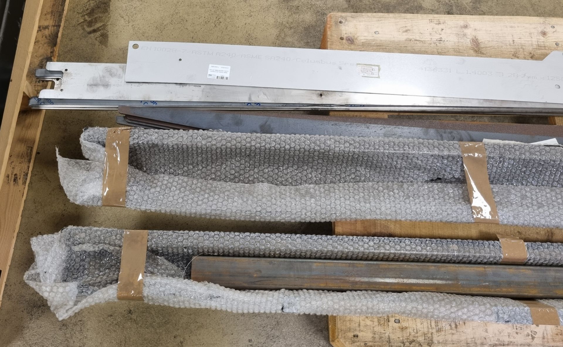 Metal covers, shims and covers, approximately 20 pieces