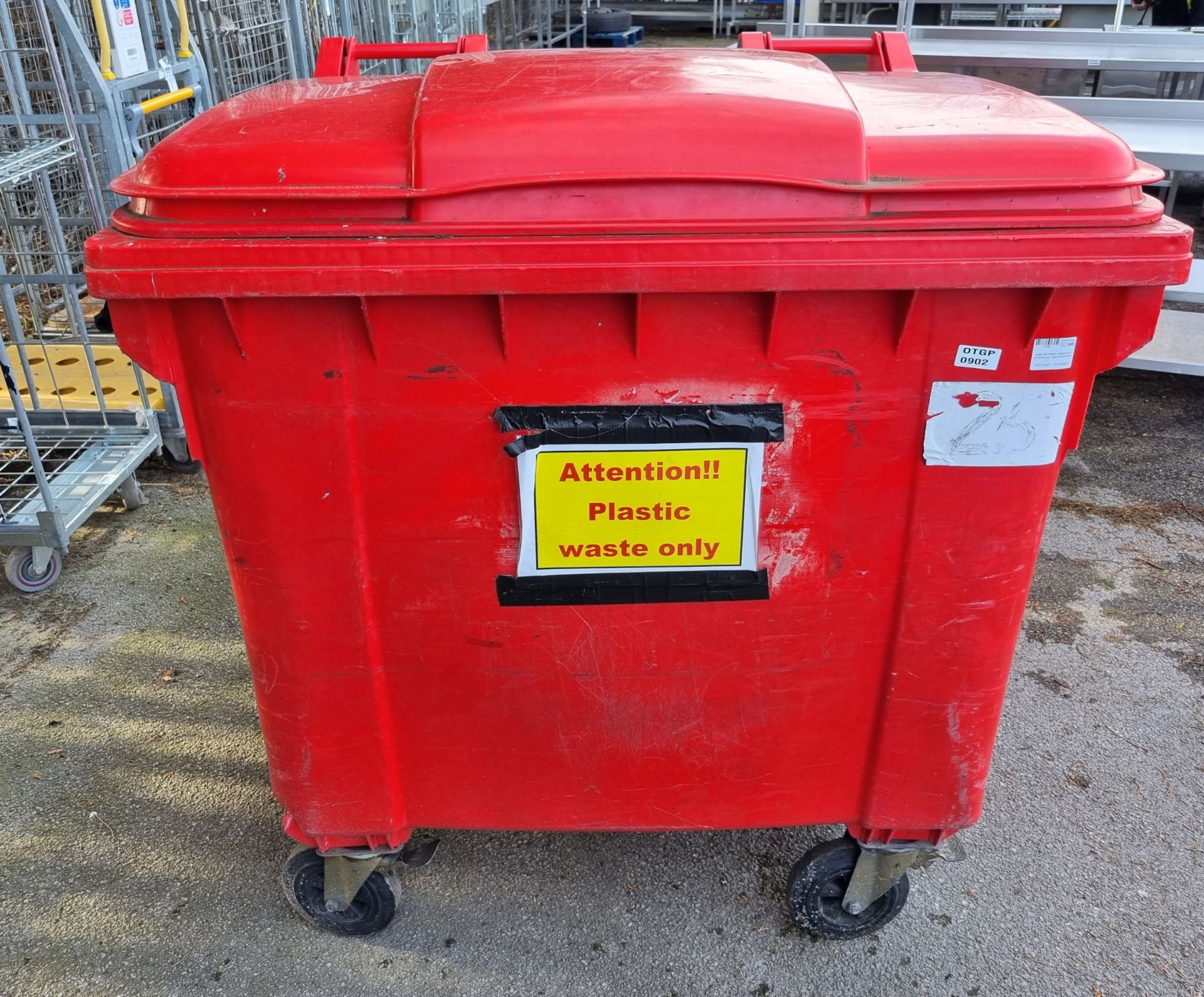 Large red plastic wheelie bin - dimensions: 120 x 100 x 130cm