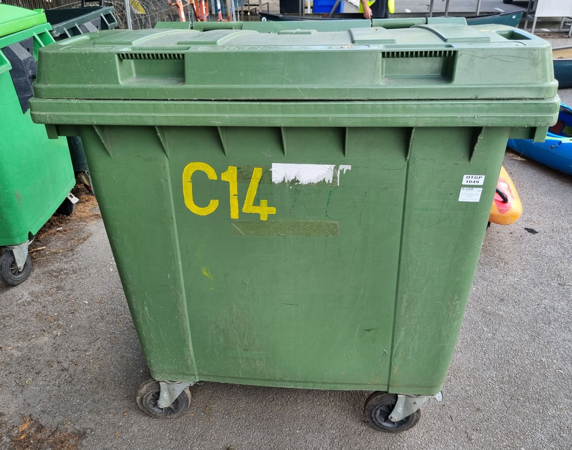 Large green plastic wheelie bin - L 1200 x W 1000 x H 1300mm