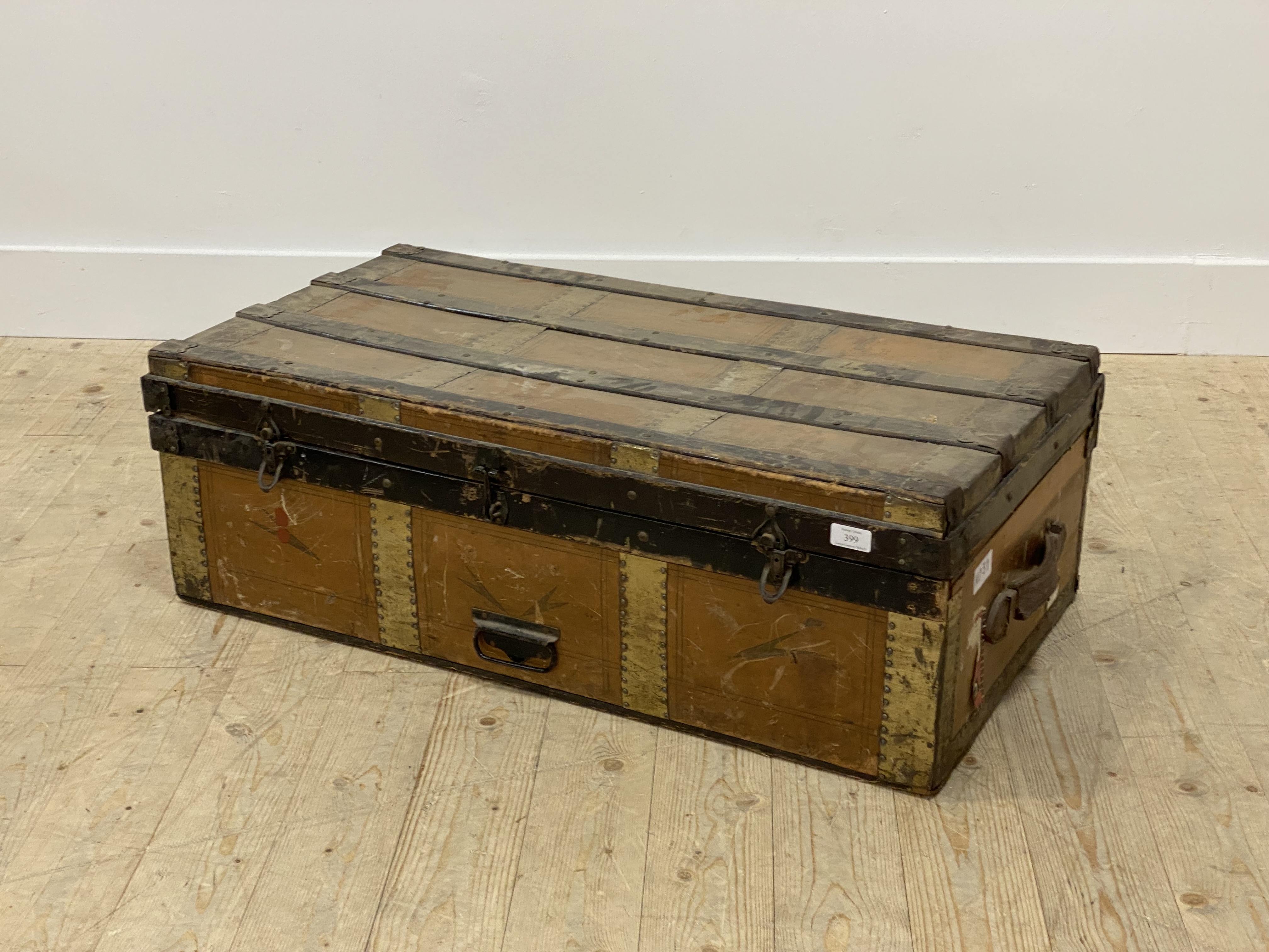 An early 20th century tooled leather and wooden bound steamer trunk ...