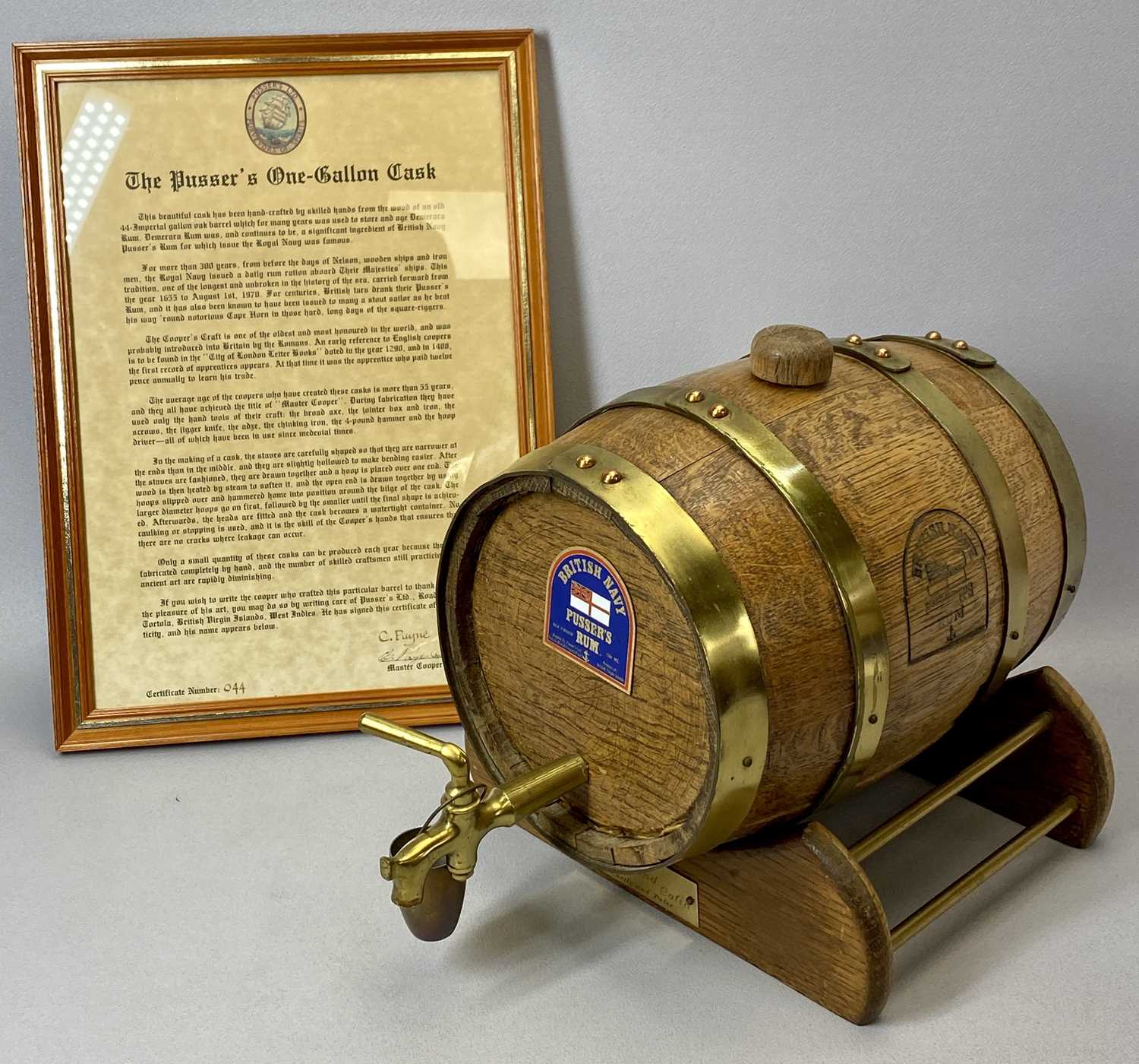 PUSSER'S BRITISH NAVY RUM, a coopered one gallon cask on stand with ...