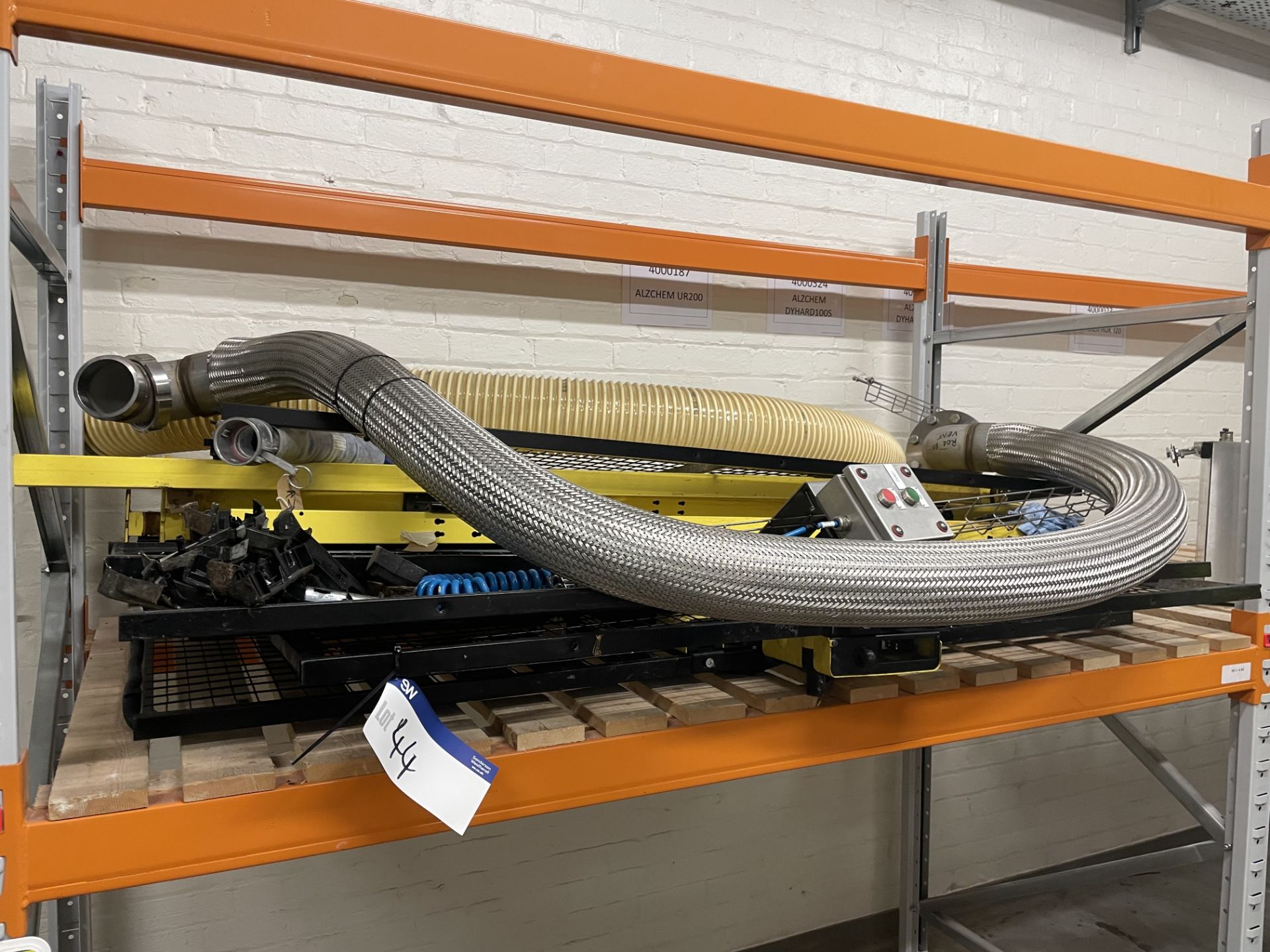 Flexible Piping, Safety Fencing & Control Panel, on two shelves of ...