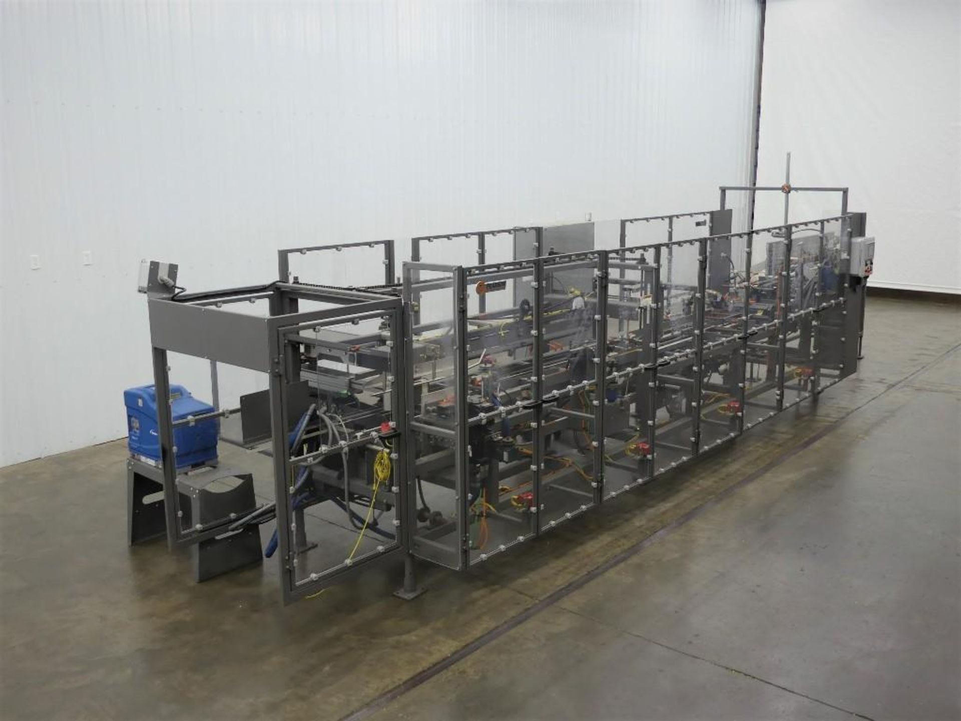 Used Case Erector and Bottom Glue Sealer with: Output rate: up to 55 ...