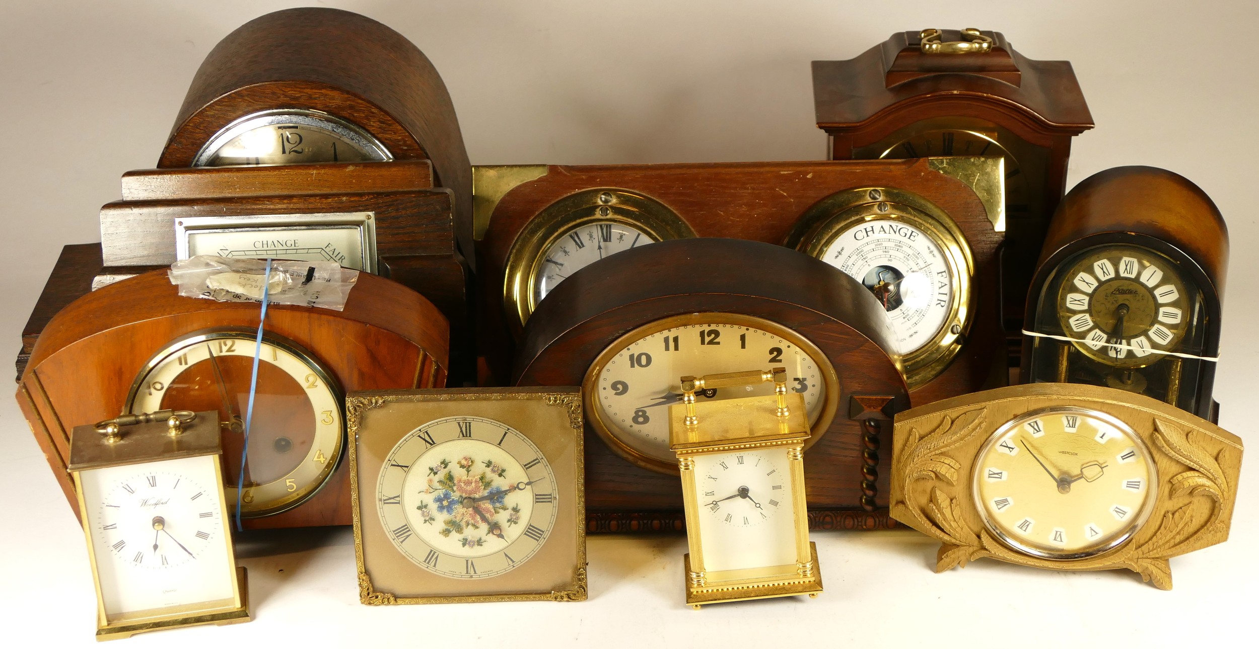 A collection of miniature novelty clocks, together with traveling alarm ...