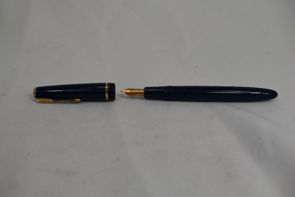 A Parker Duofold Senior aeromatic fill fountain pen in blue, having ...