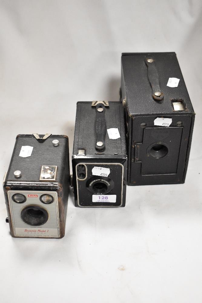 Three early 20th century photographic cameras including Ensign, Kodak ...