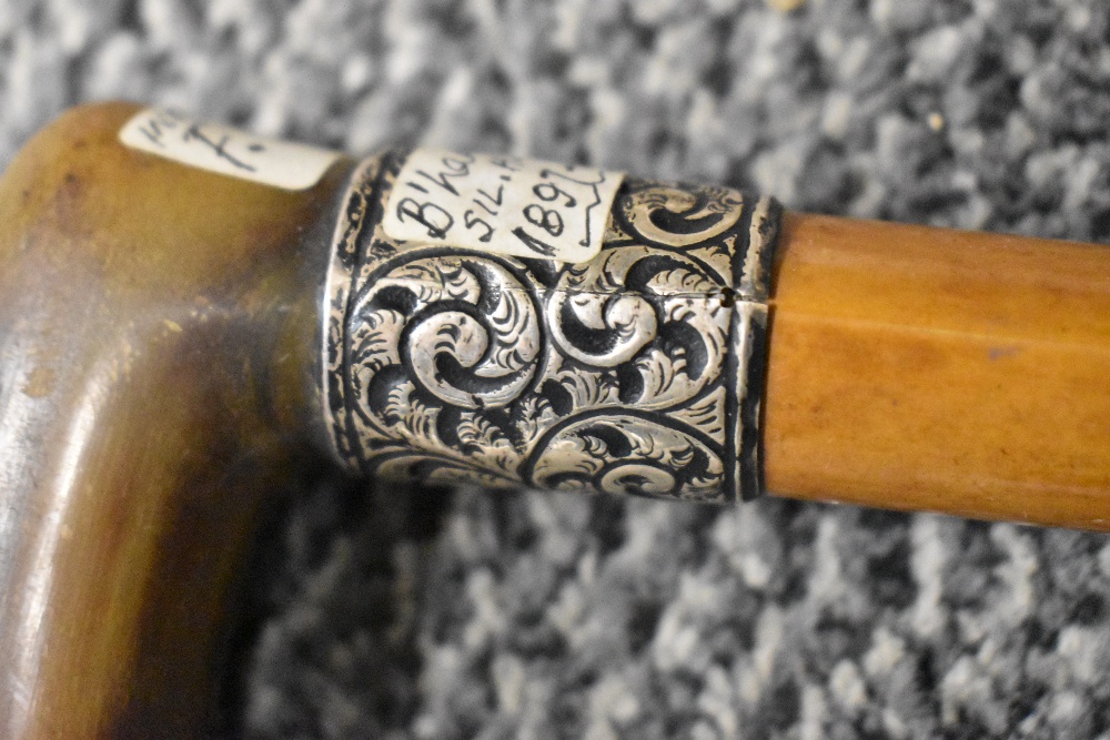 A Victorian walking cane, having hall marks for Birmingham, circa 1897/ ...
