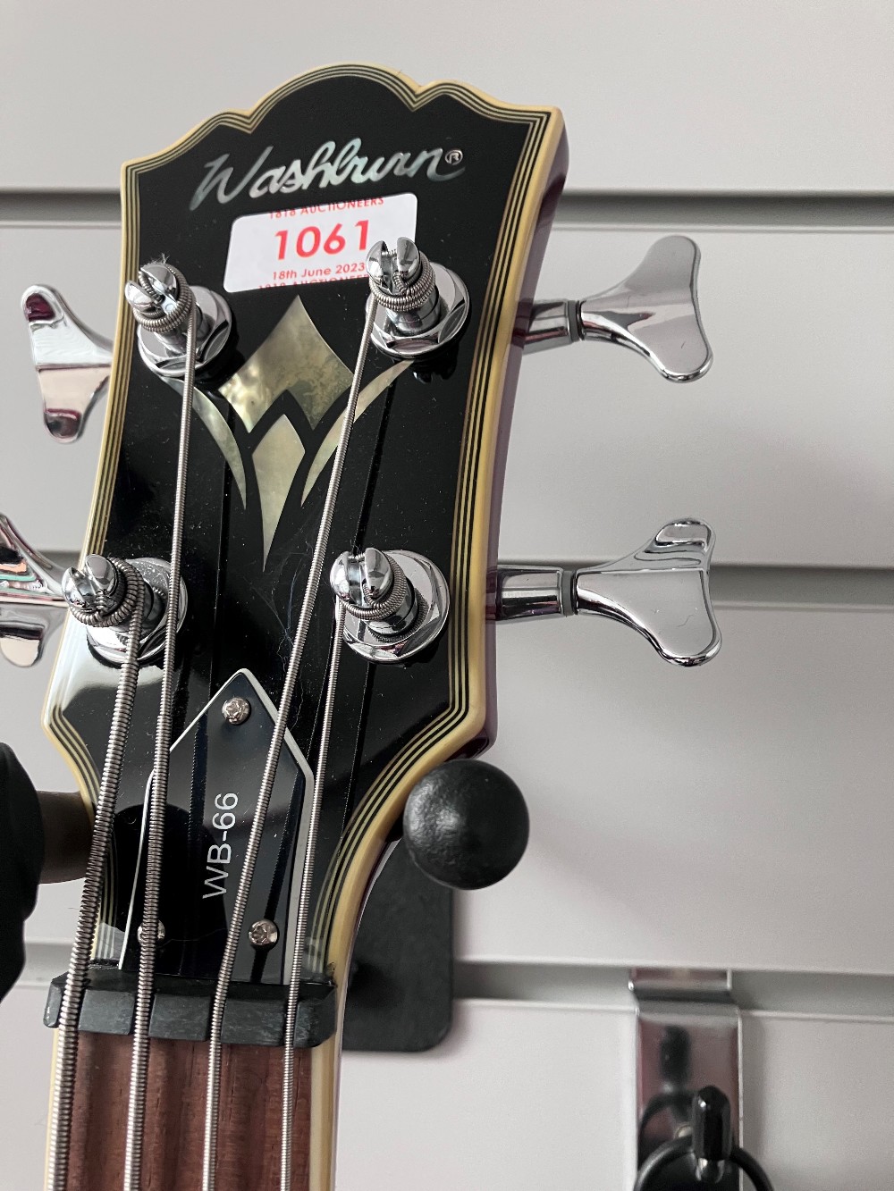 A Washburn WB 66 bass guitar and gig bag
