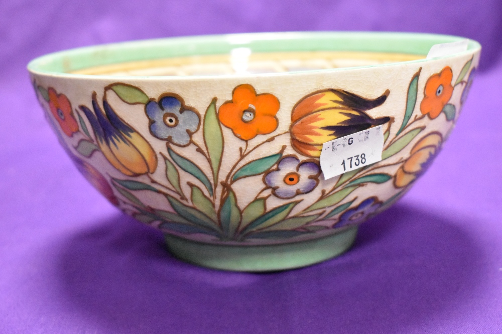 A Bursley ware footed bowl, Charlotte Rhead mark having typical tube ...