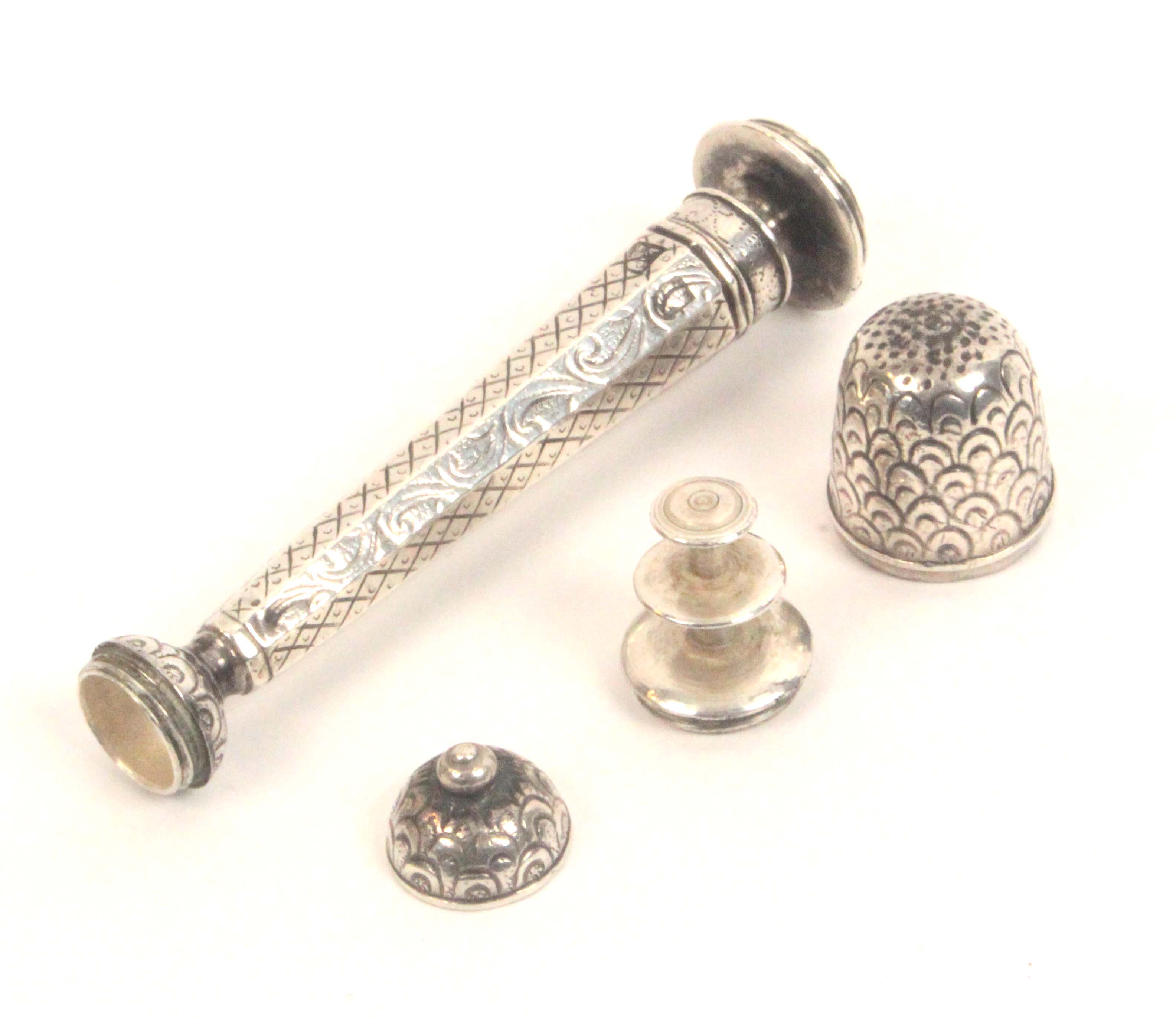 A mid 18th Century silver thimble compendium, French or German, the ...
