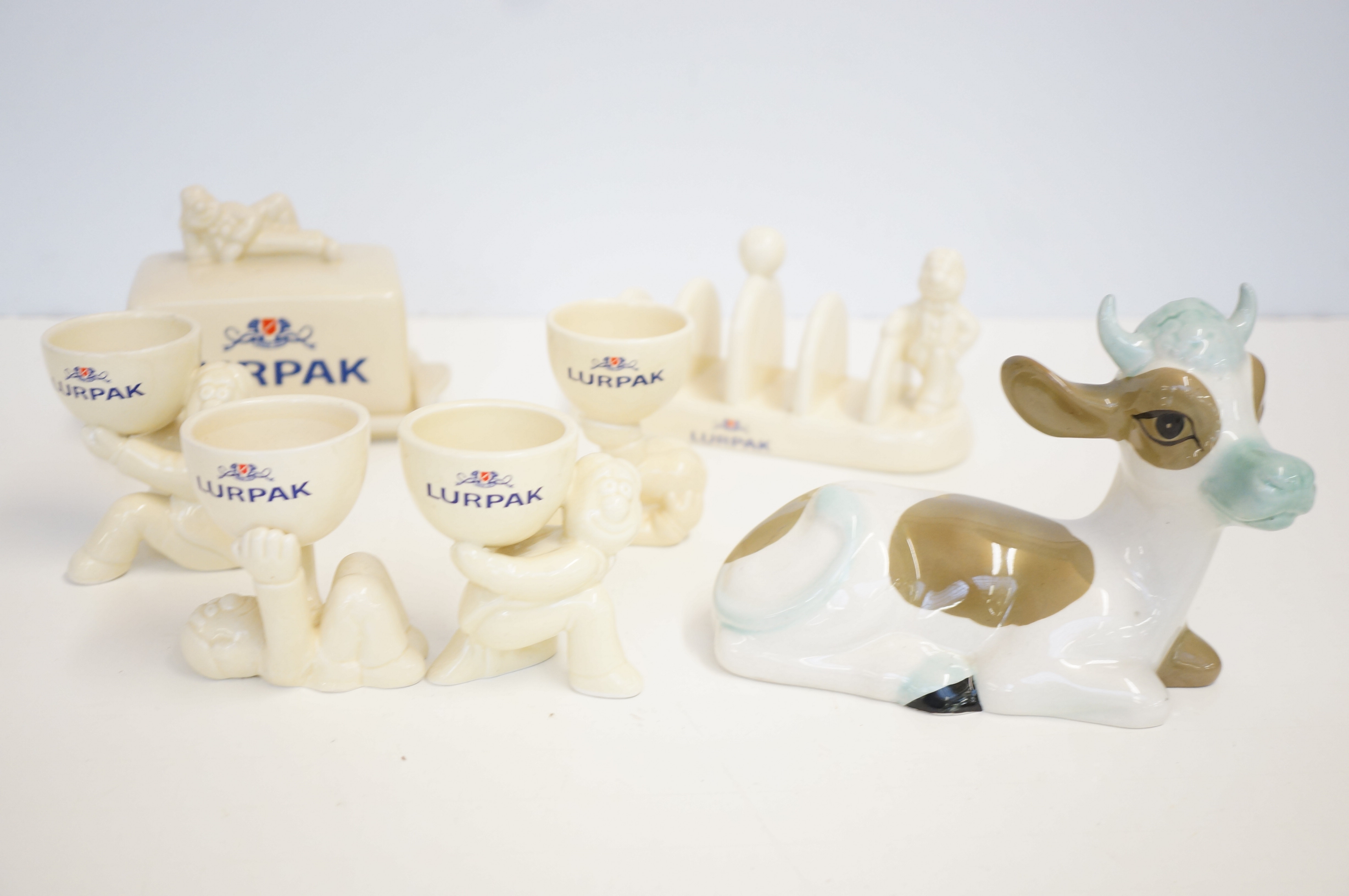 Collection of Lurpak collectables to include szeiler cow