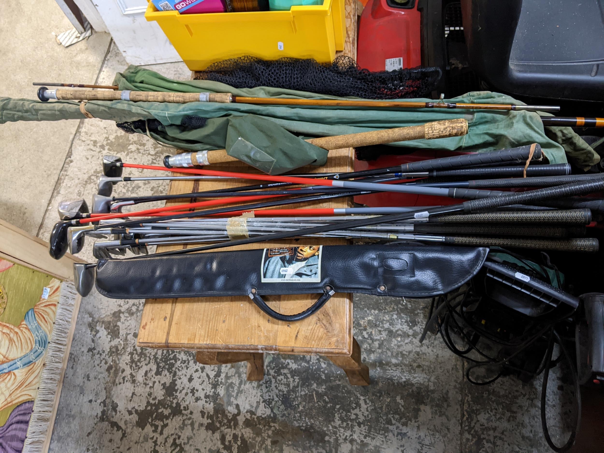 A Milward Floatrover split can fishing rod, a fibreglass fishing rod, a ...
