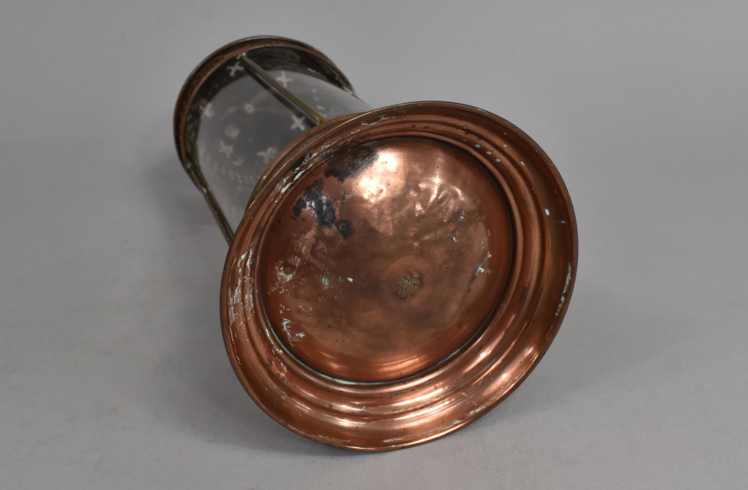 An Arts and Crafts Copper Candle Lamp with Cylindrical Glass Shade and ...