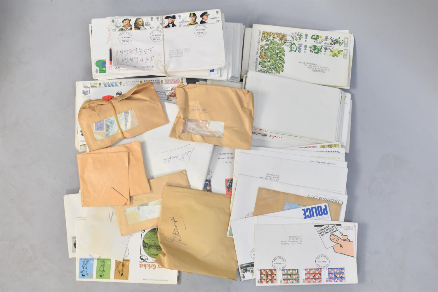 A Box Containing Various Loose First Day Covers and a Toy Squeeze Box ...