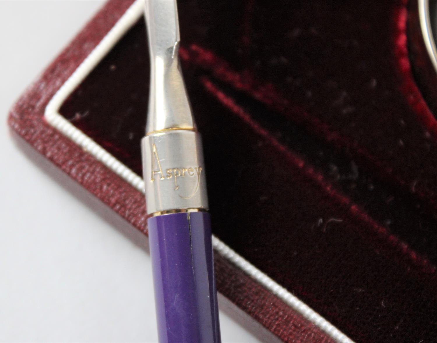 A Cased Asprey Desk Set Comprising Ruler, Magnifying Glass and Letter ...