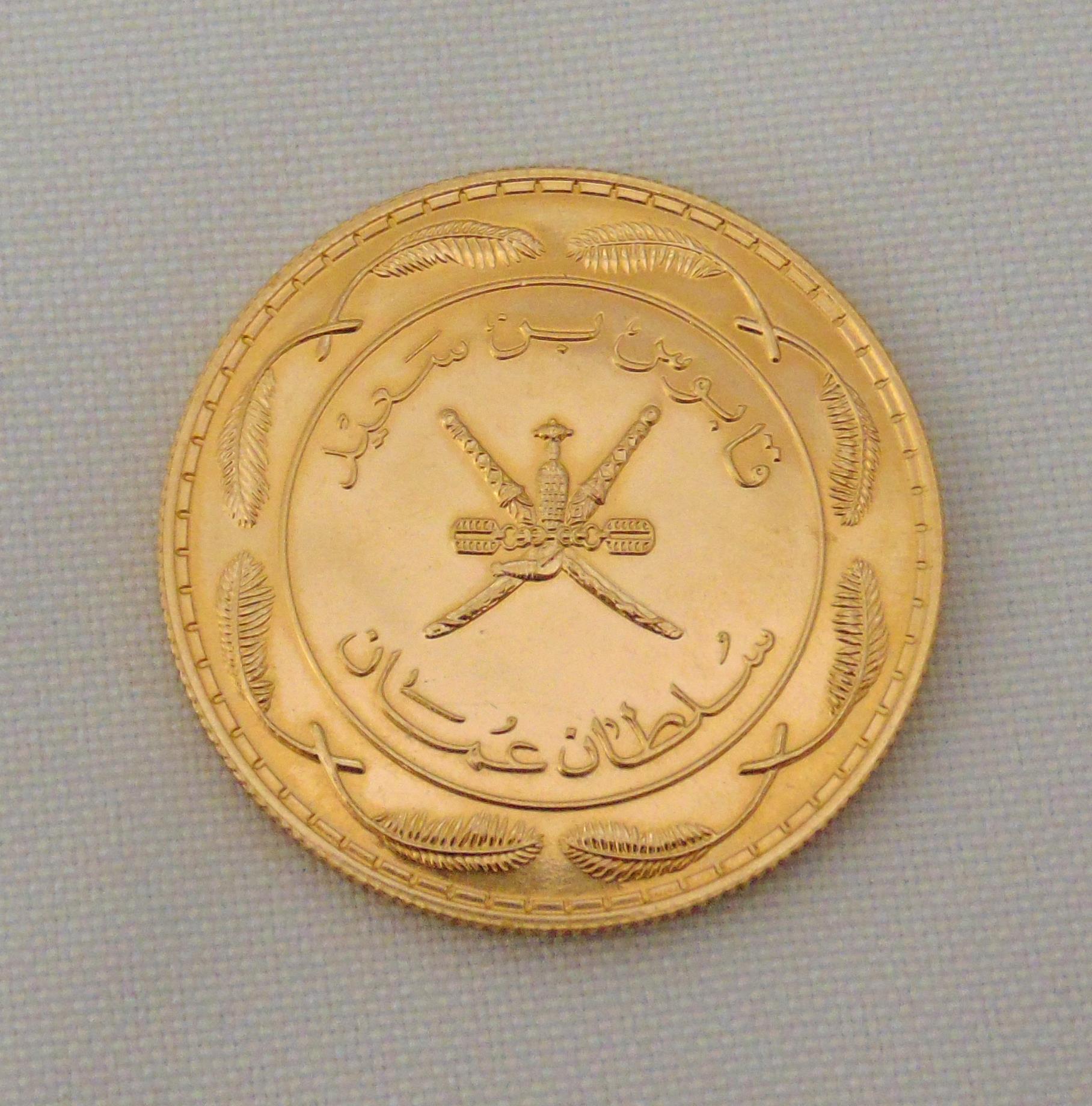 A Sultanate of Oman Half Saidi Rial 22ct gold coin dated 1975, approx ...