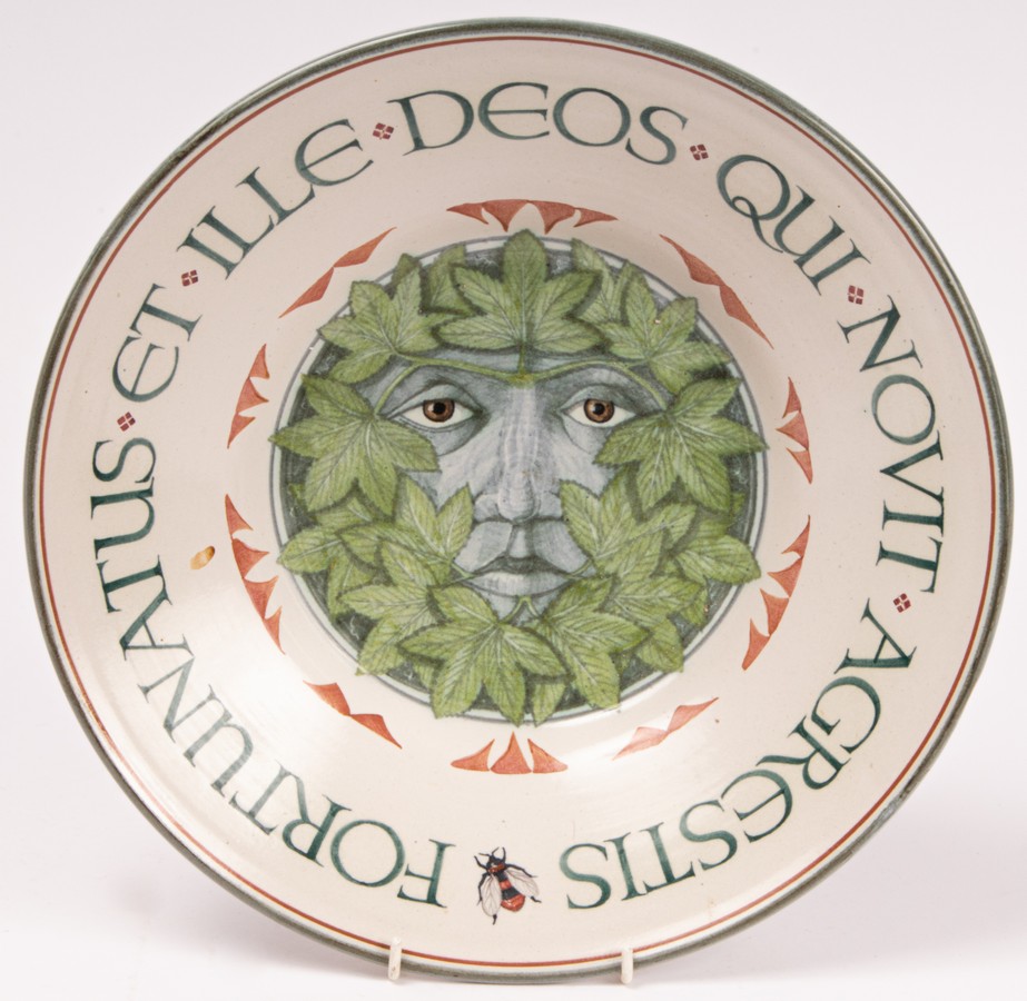 Laurence McGowan (born 1942) a dish decorated with a green man and ...