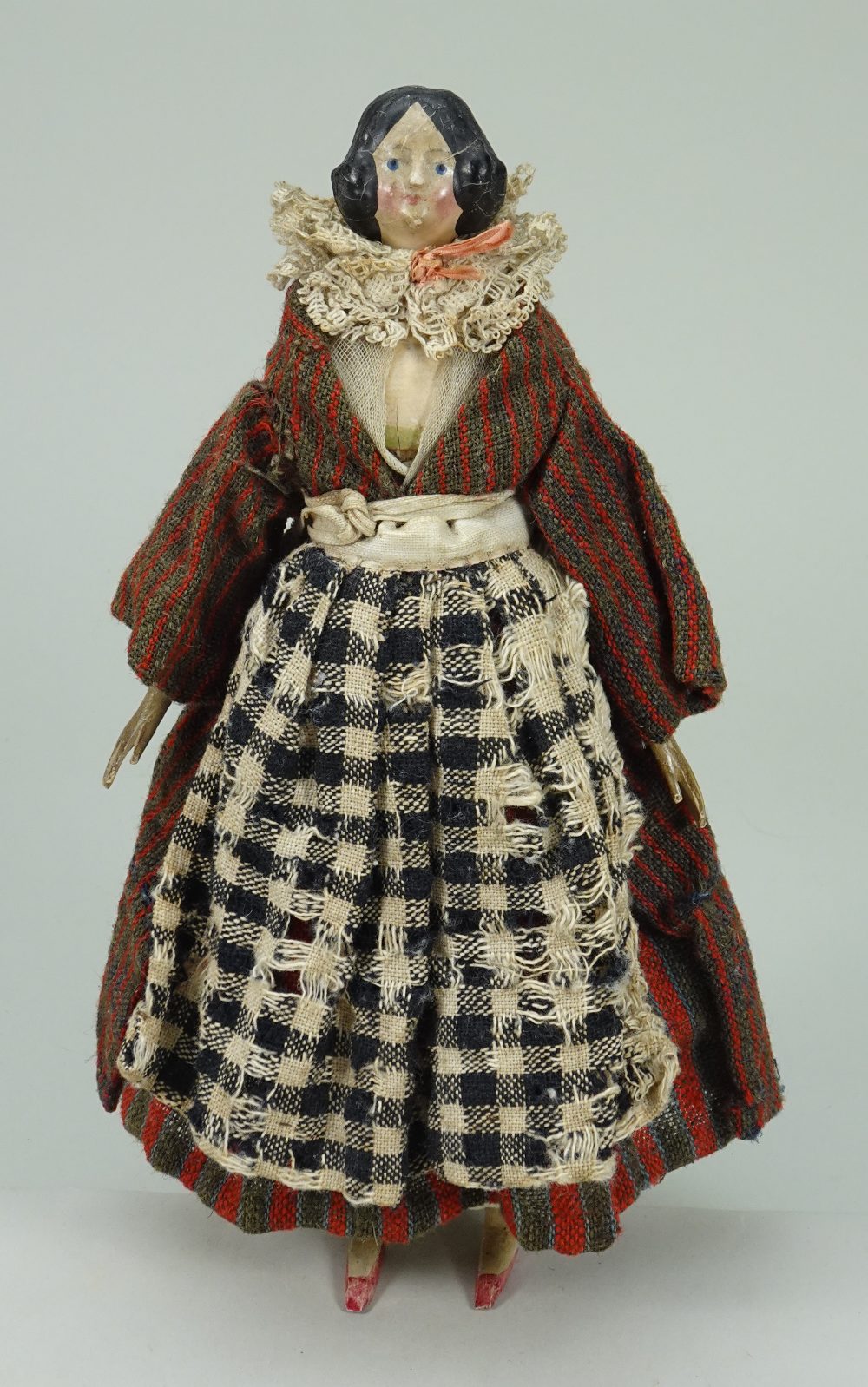 Early papier-mache shoulder head doll in original costume, German circa ...