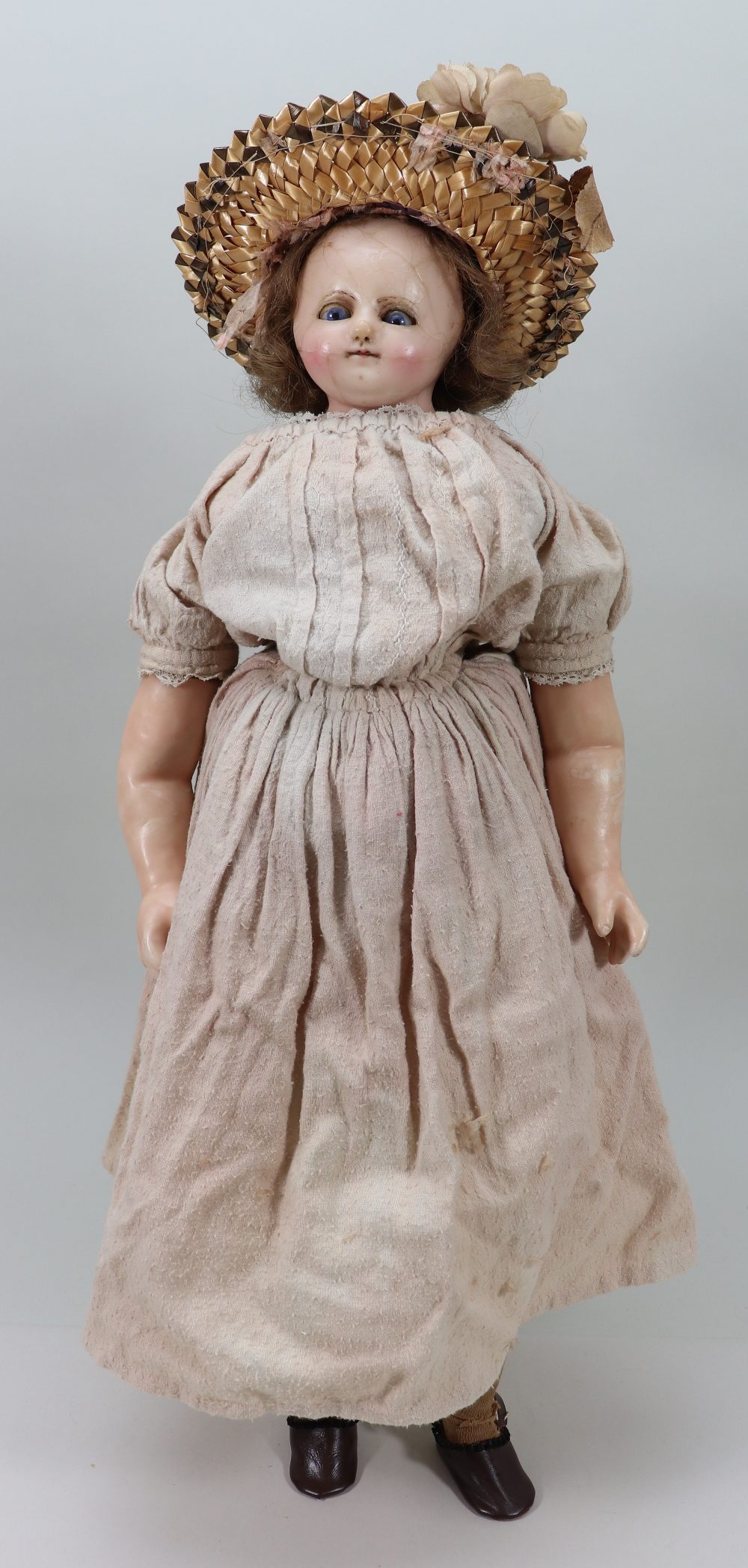 A wax over composition shoulder head doll, English circa 1850, with ...