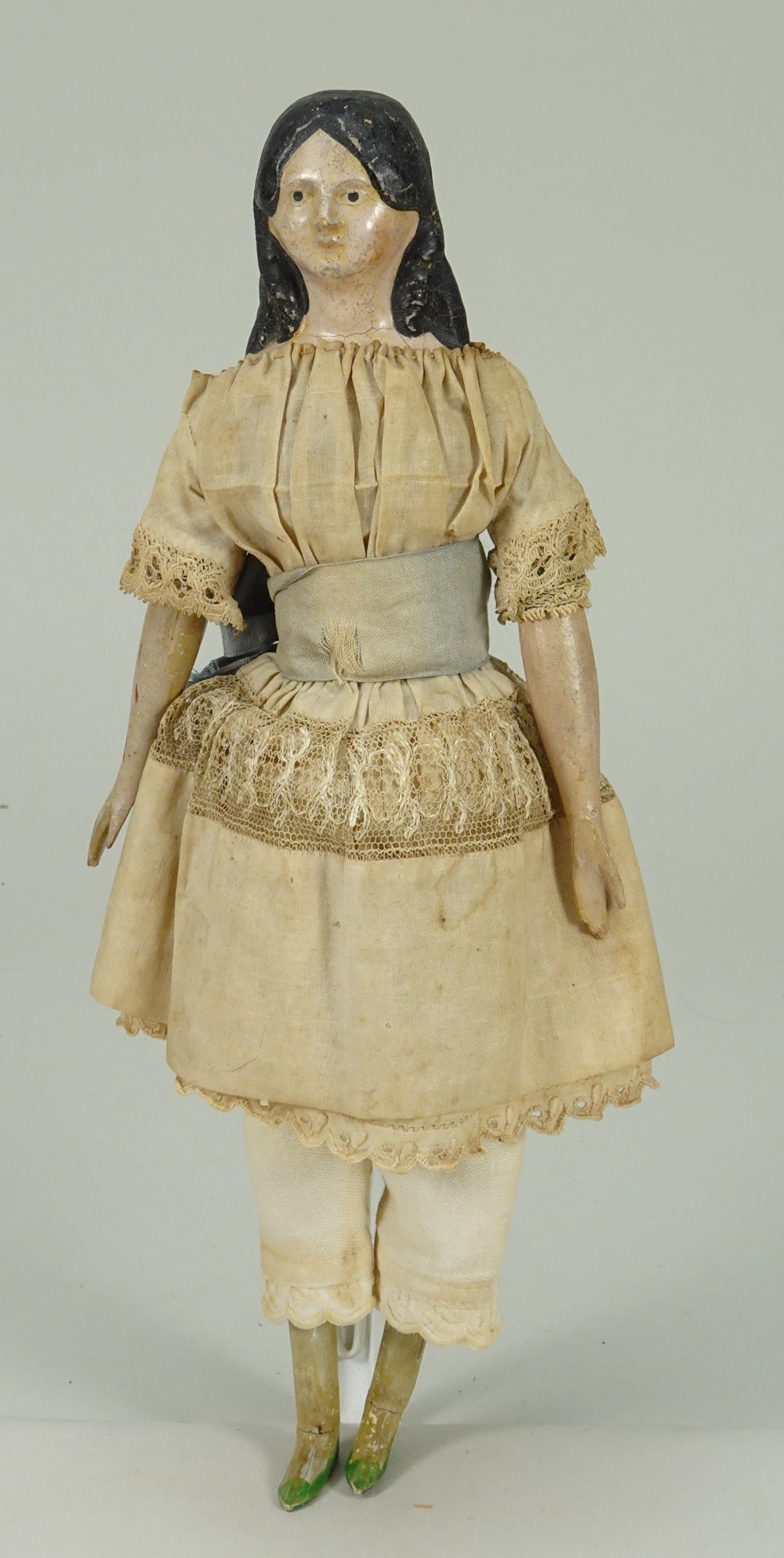 Early papier-mache shoulder head doll in original costume, German circa ...