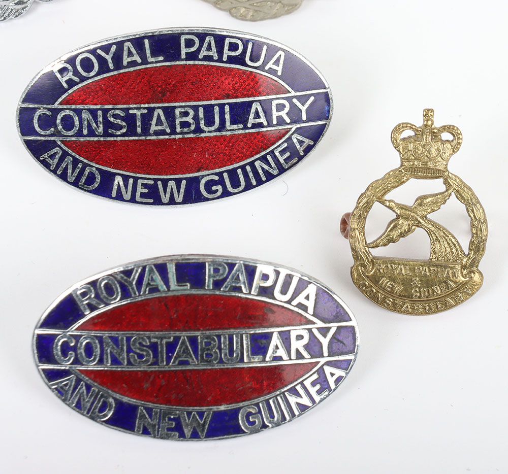 Royal Papua & New Guinea Constabulary Badges: White metal two piece ...